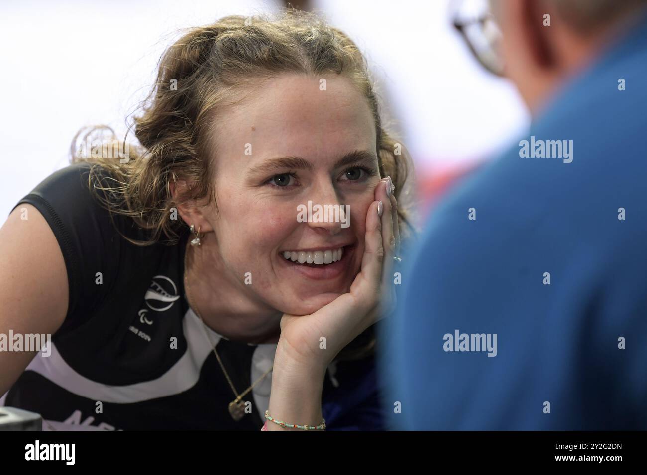 Anna Grimaldi of New Zealand being interviewed by TV after winning the ...