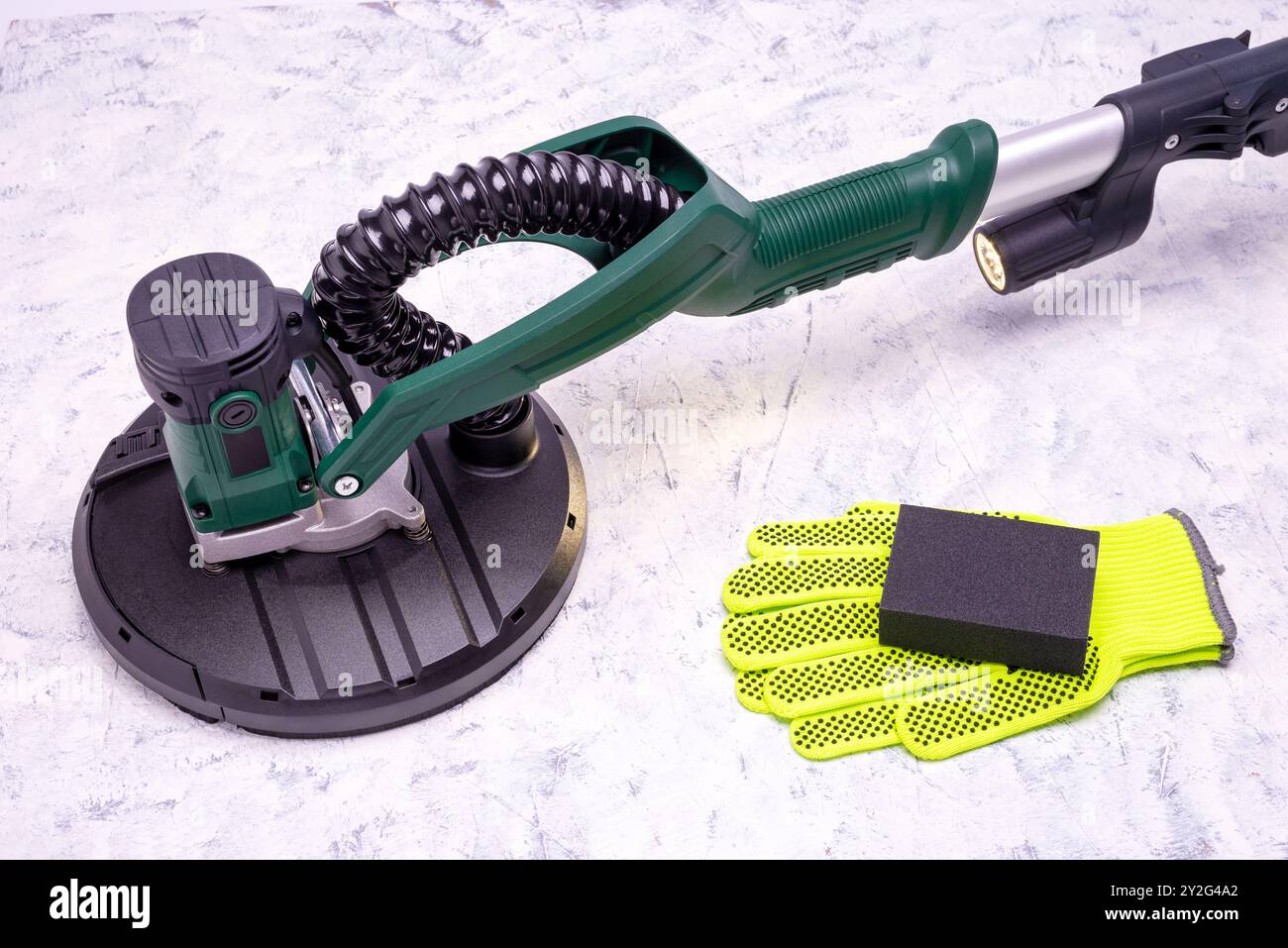 Tool for smoothing and sanding walls. Electric sander with telescopic ...