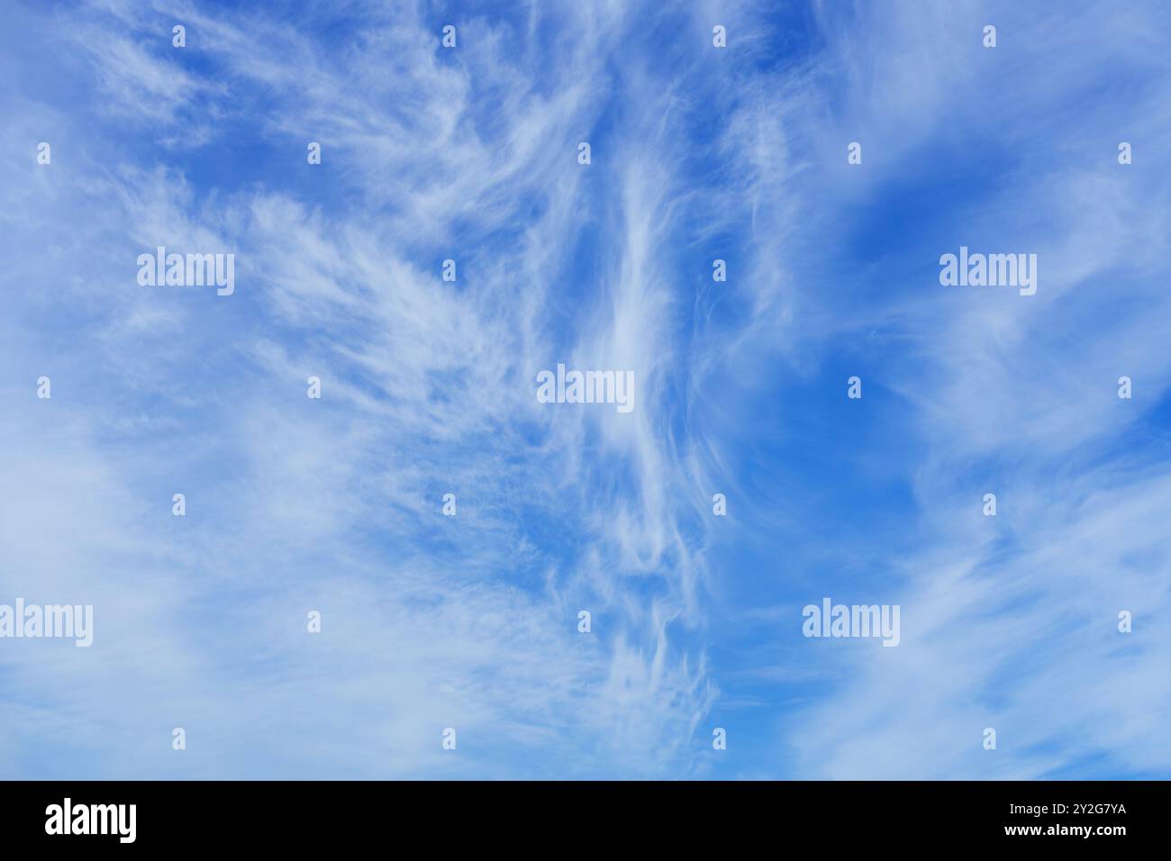 Blue sky with cirrus clouds, high cloud made of ice crystals in summer ...