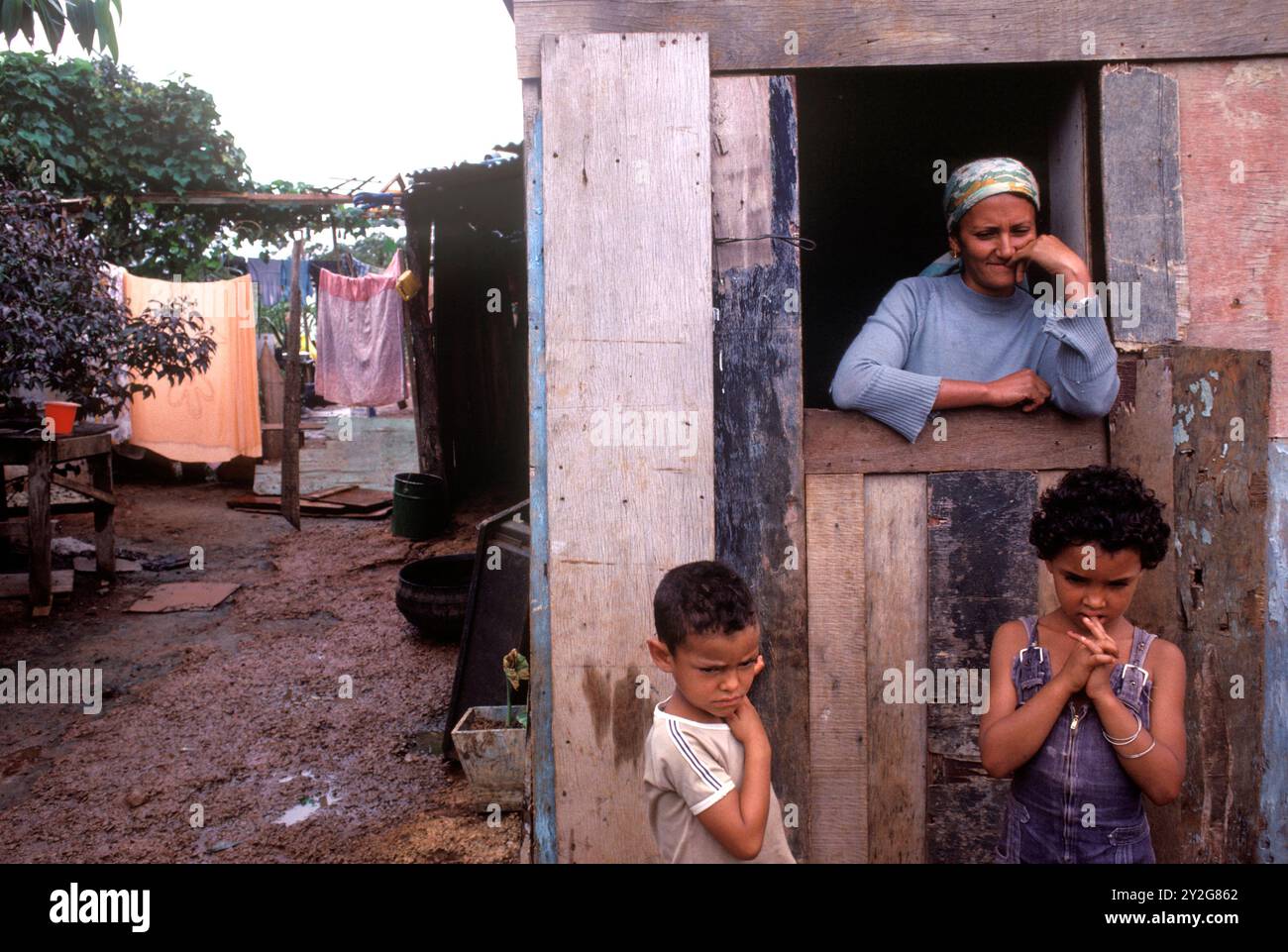 Brazil, the exterior of a favela, a slum house in a poor shanty town ...