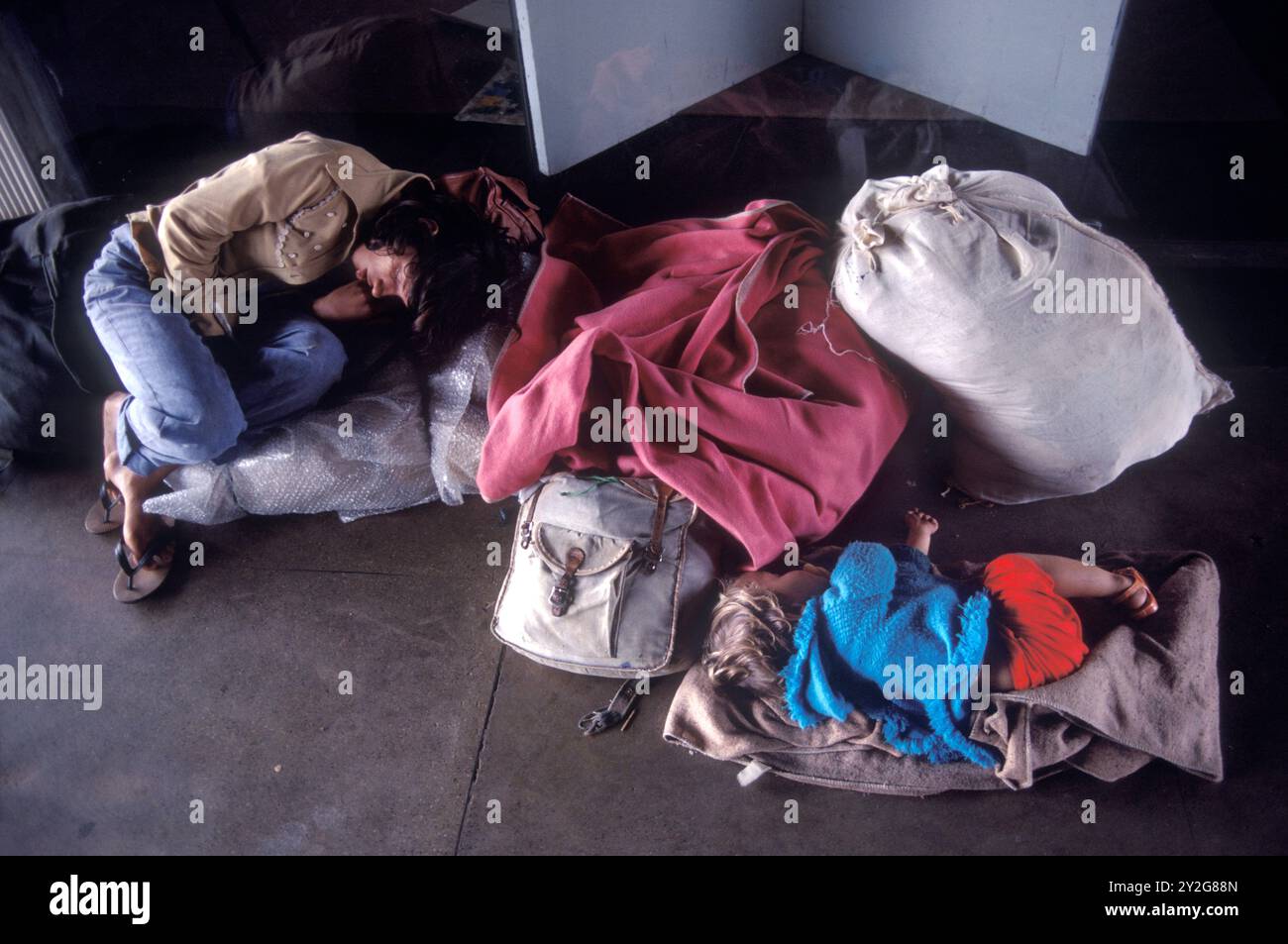 Brazil, a homeless family, mother and a baby girl with their ...