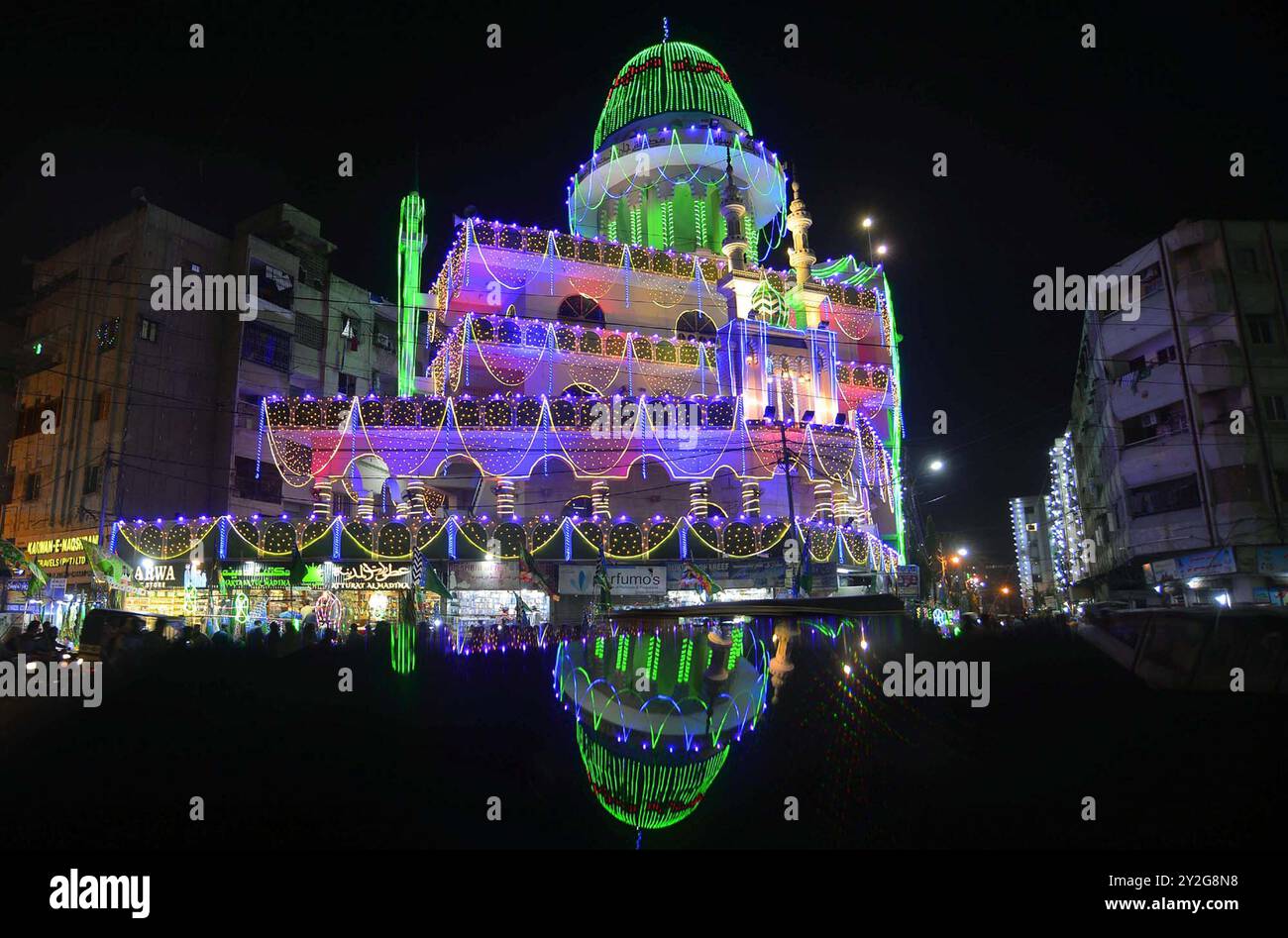 A beautiful illuminated view of Kanzul Emaan Mosque in connection of ...