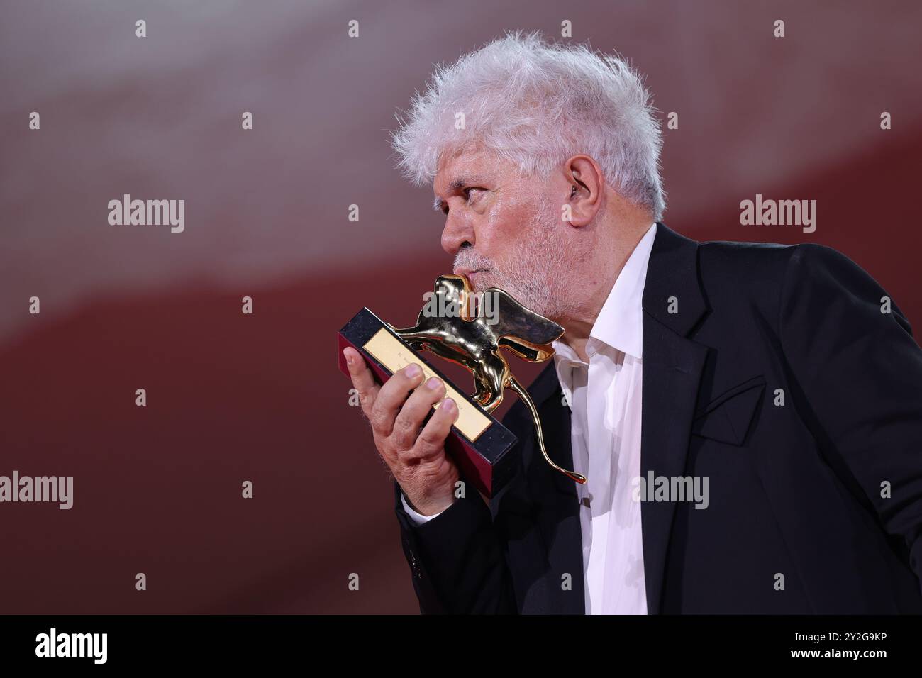 VENICE, ITALY - SEPTEMBER 07: Pedro Almodovar poses with the Coppa ...