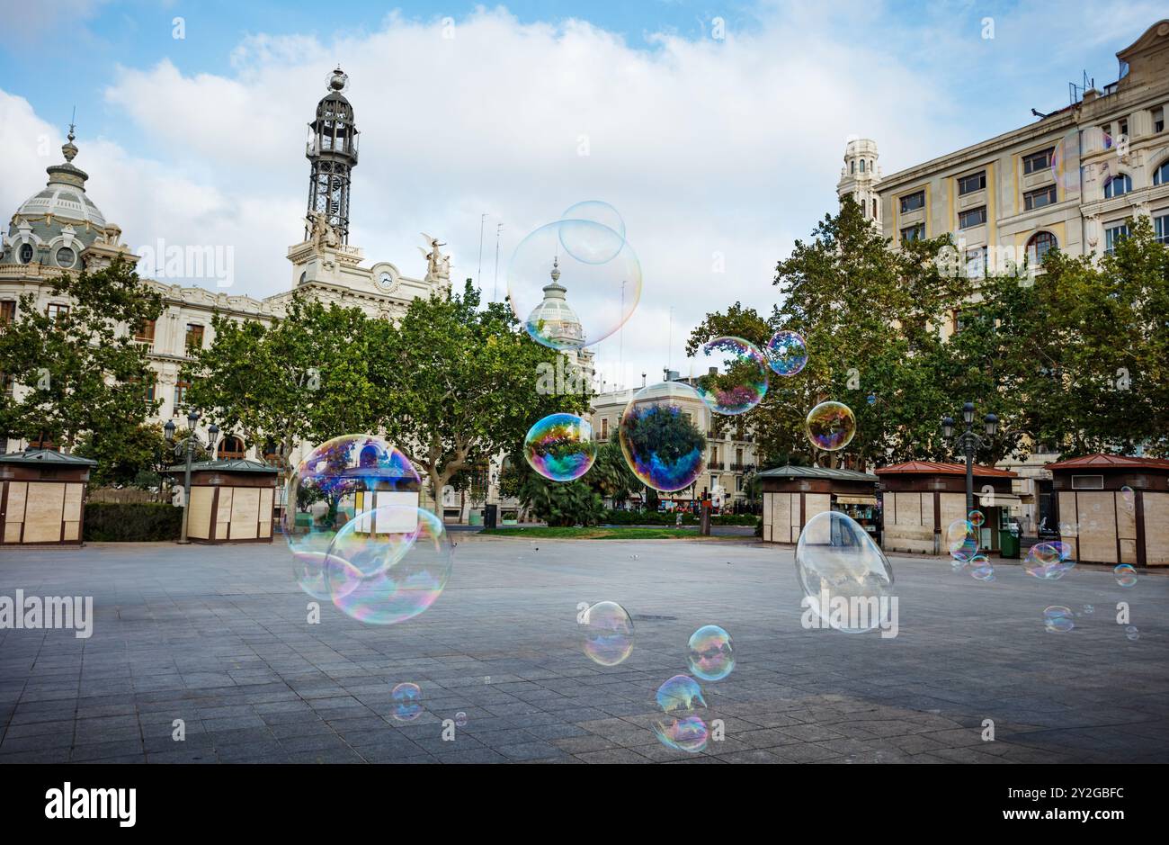 Soap bubbles floating across City Hall square in Valencia, Spain Stock ...