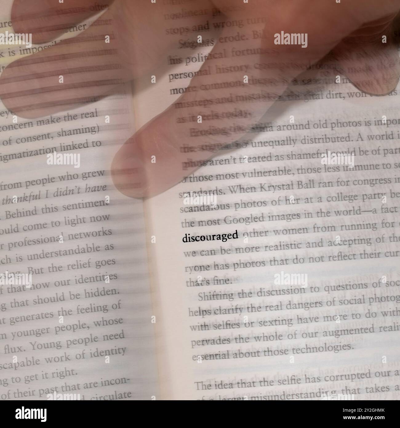 Book with word Discouraged highlighted Stock Photo - Alamy