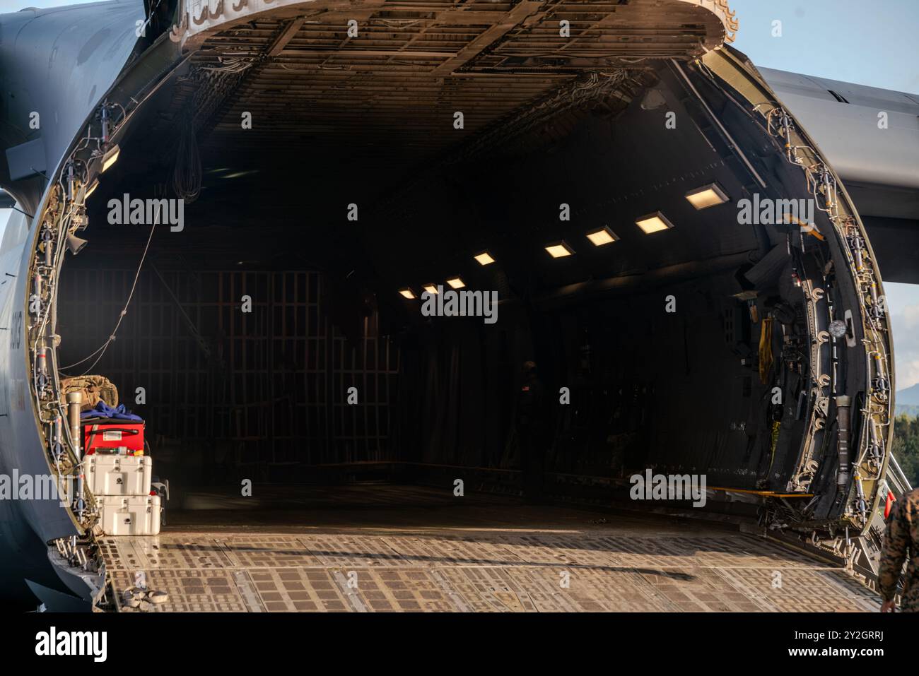 Cargo deck in modern military heavy transport aircraft Stock Photo - Alamy