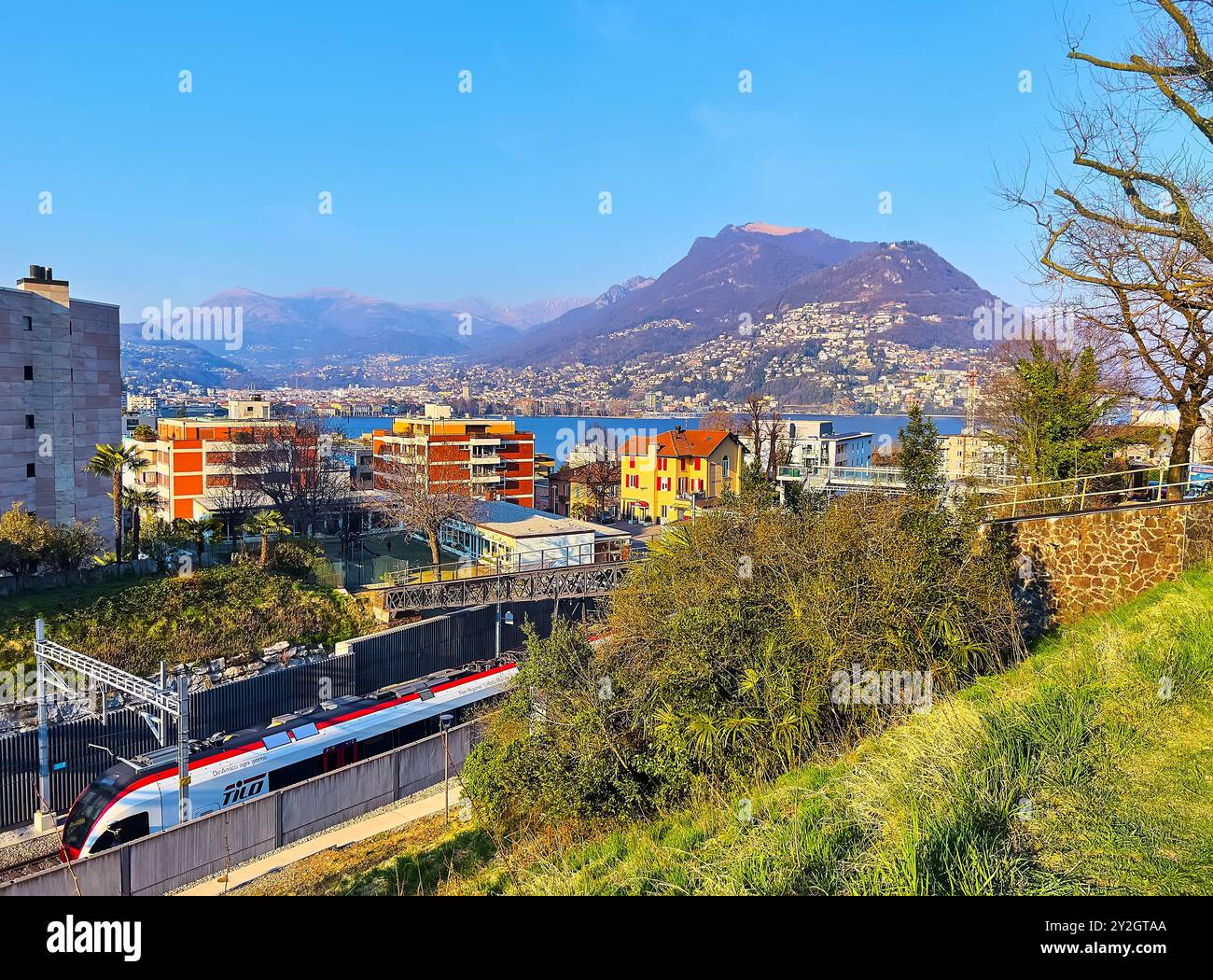 LUGANO, SWITZERLAND - MARCH 22, 2022: The modern TiLo passenger train ...