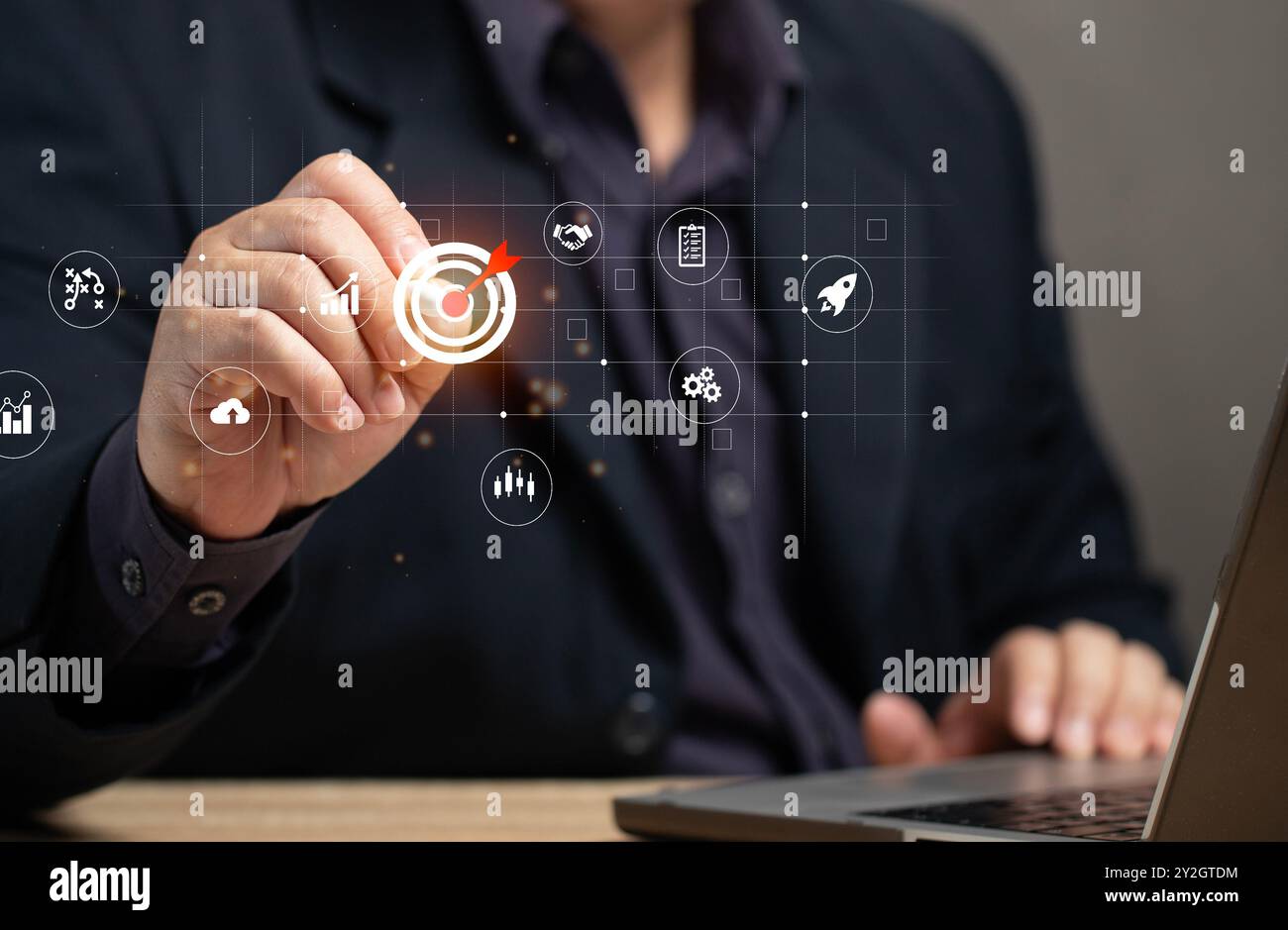 Man using pen to point at virtual screen at marketing target on map ...