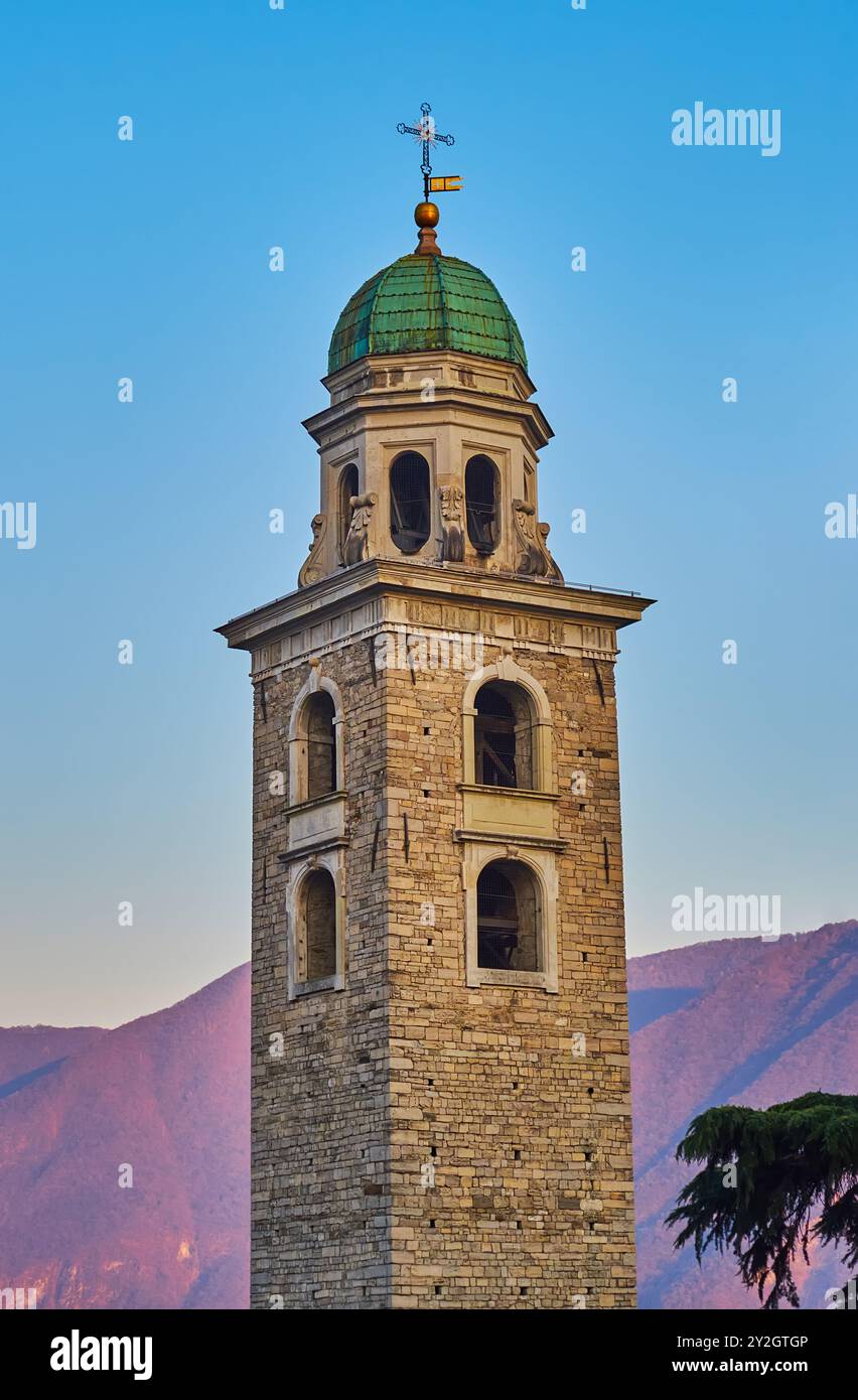The medieval slender stone bell tower of San Lorenzo Cathedral against ...