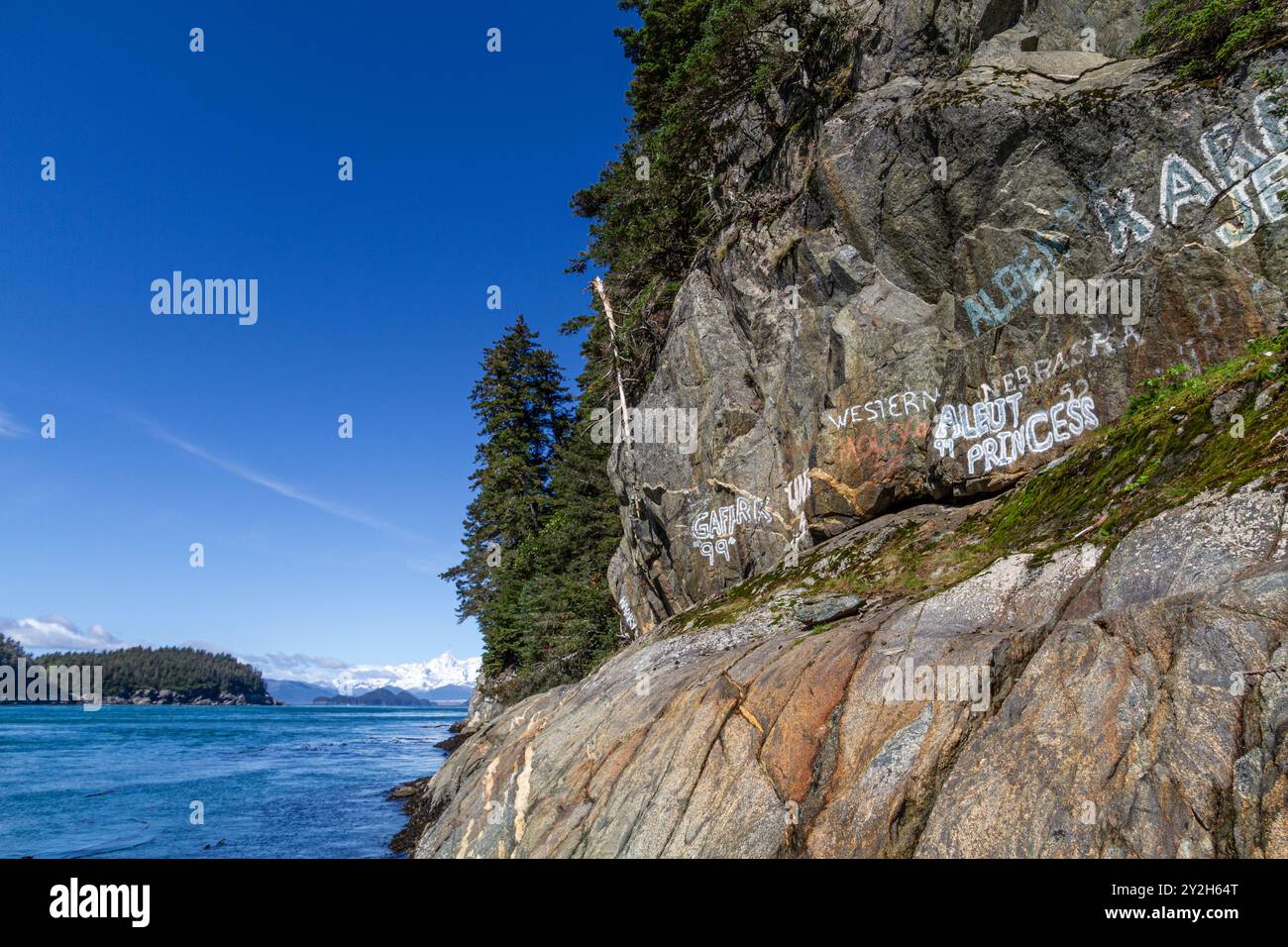 Names of fishing boats painted on the rocks in Cross Sound with the ...
