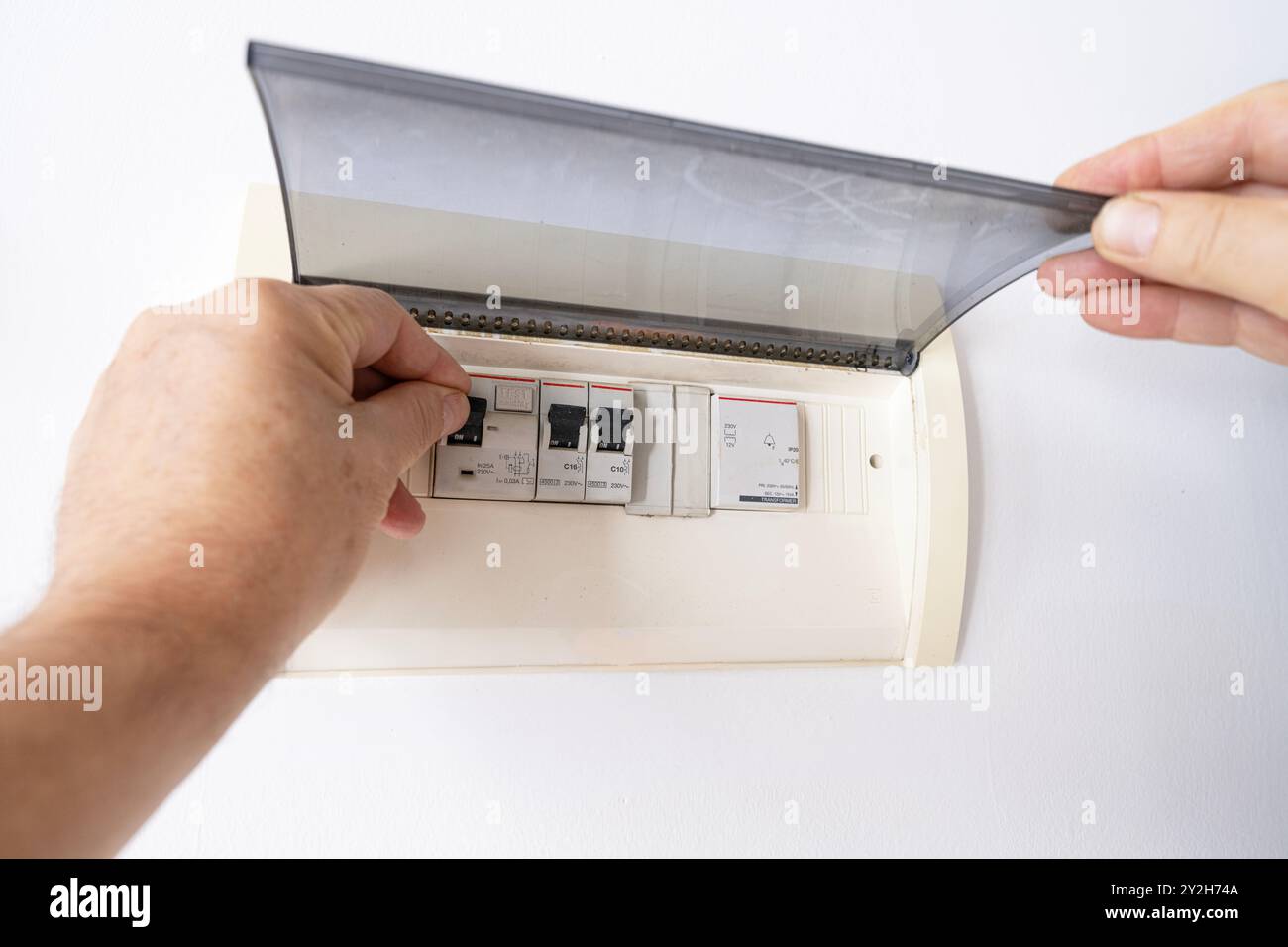 a male hand turning on the life-saving switch Stock Photo - Alamy