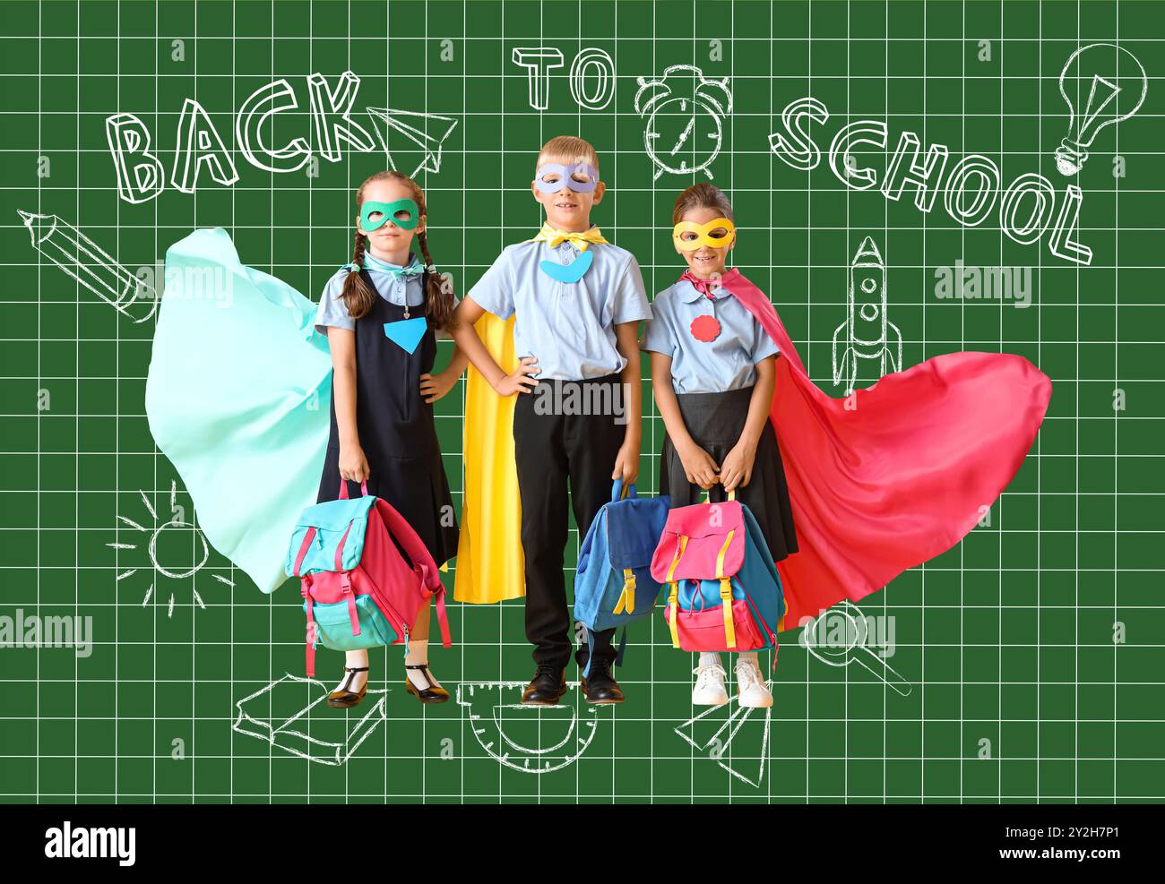 Little students in superhero costumes on green background. Back to ...
