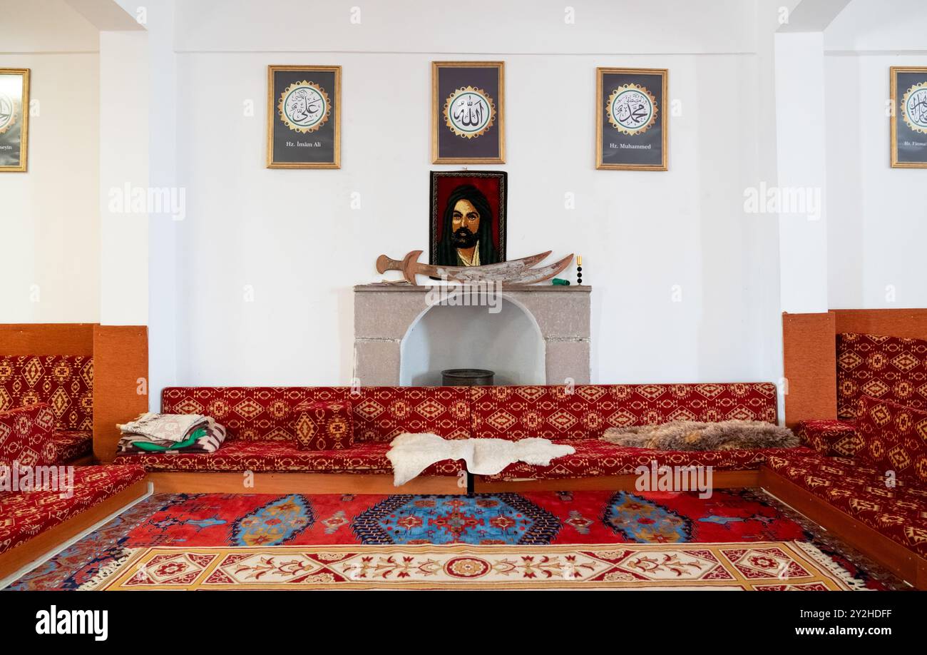 Ankara, Turkey-August 25, 2024: Oriental room decorated with carpet ...