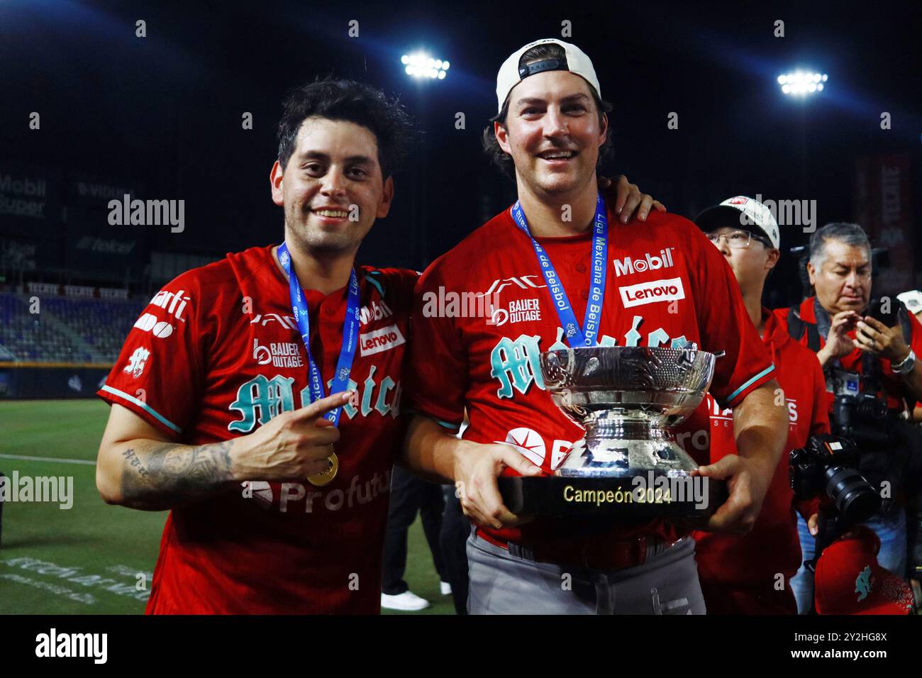 Juan Carlos Gamboa #47 and Trevor Bauer #96 of Diablos Rojos, posing ...