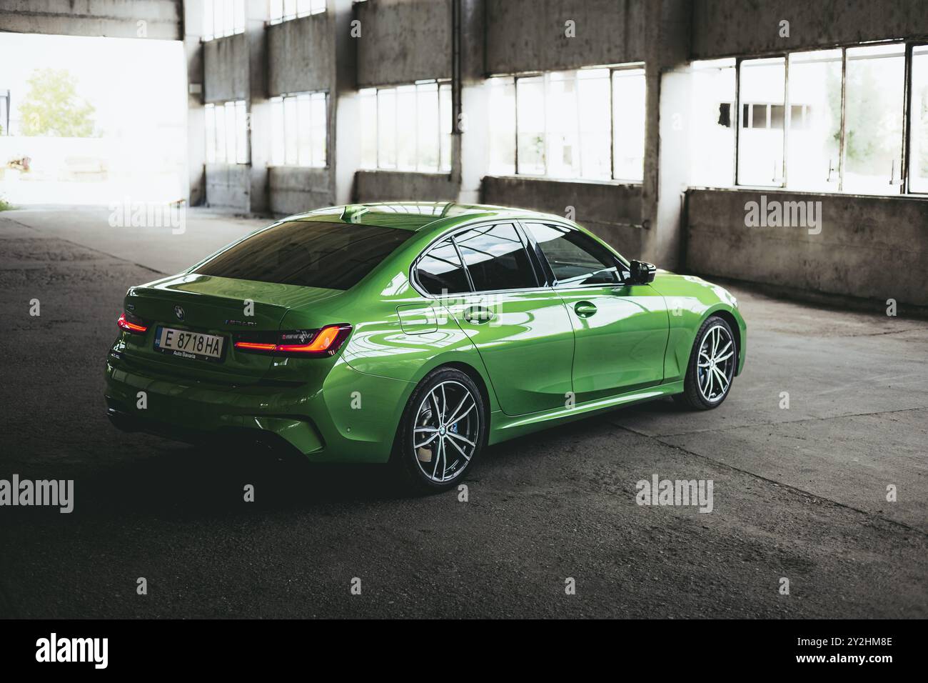 Bulgaria - 09 09 2024: Green BMW M340i parked in an abandoned building ...