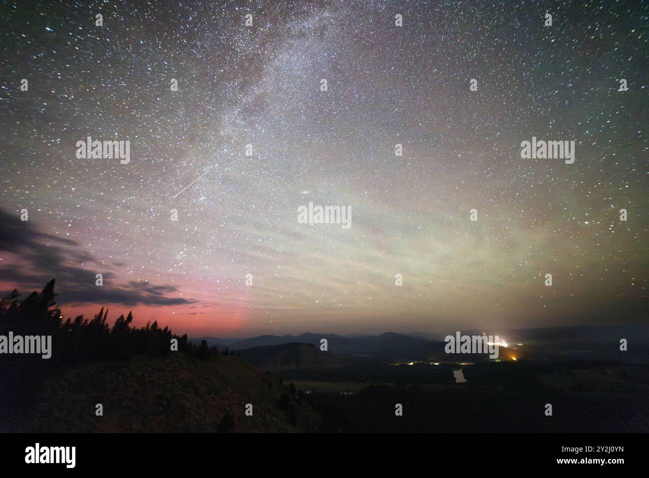 Airglow, the Milky Way Galaxy, and faint aurora borealis shining in the ...