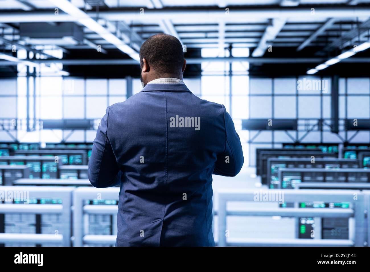 Man managing supercomputer servers hi-res stock photography and images ...