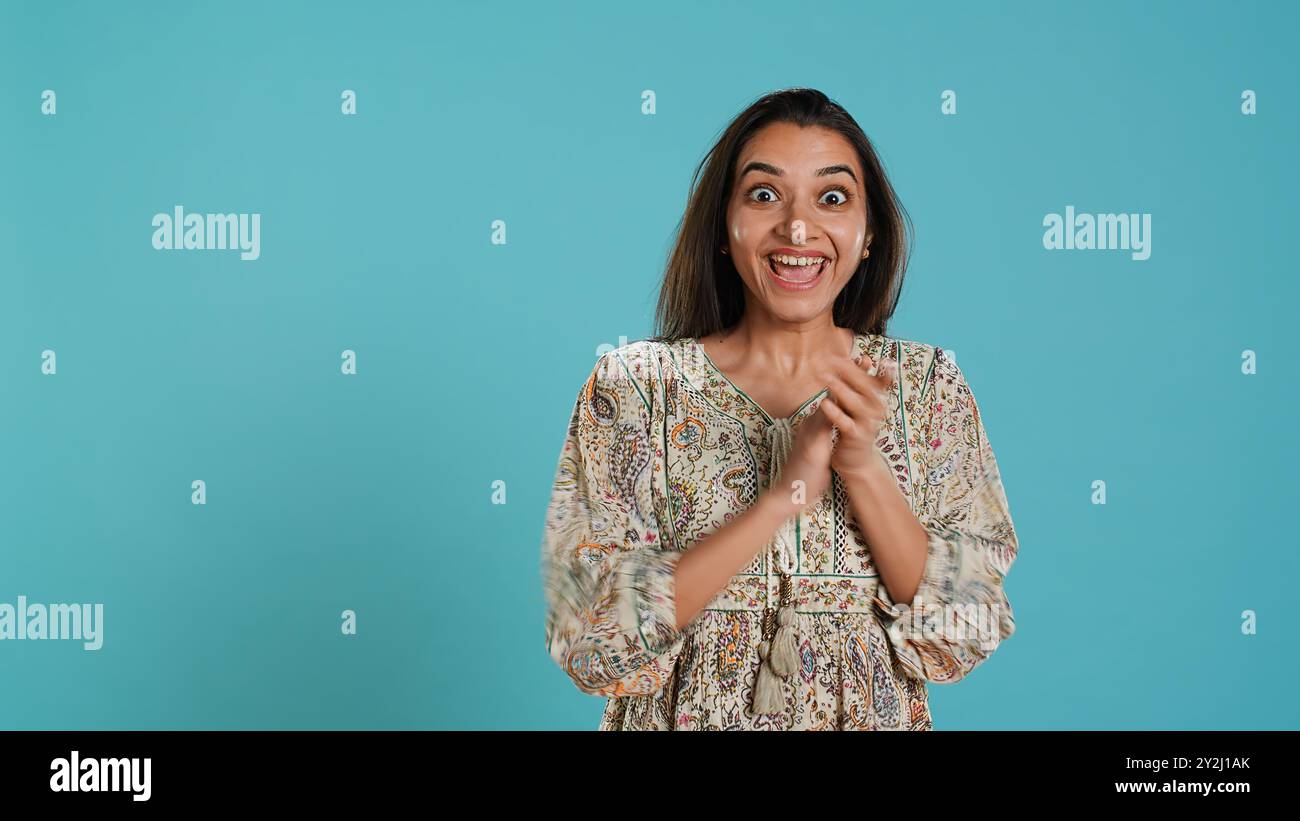 Excited woman clapping hands over hi-res stock photography and images ...