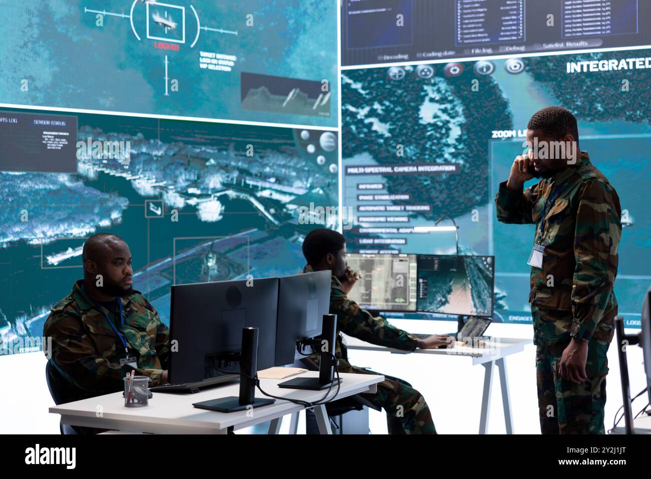 Intelligence experts in a control room managing surveillance operations ...