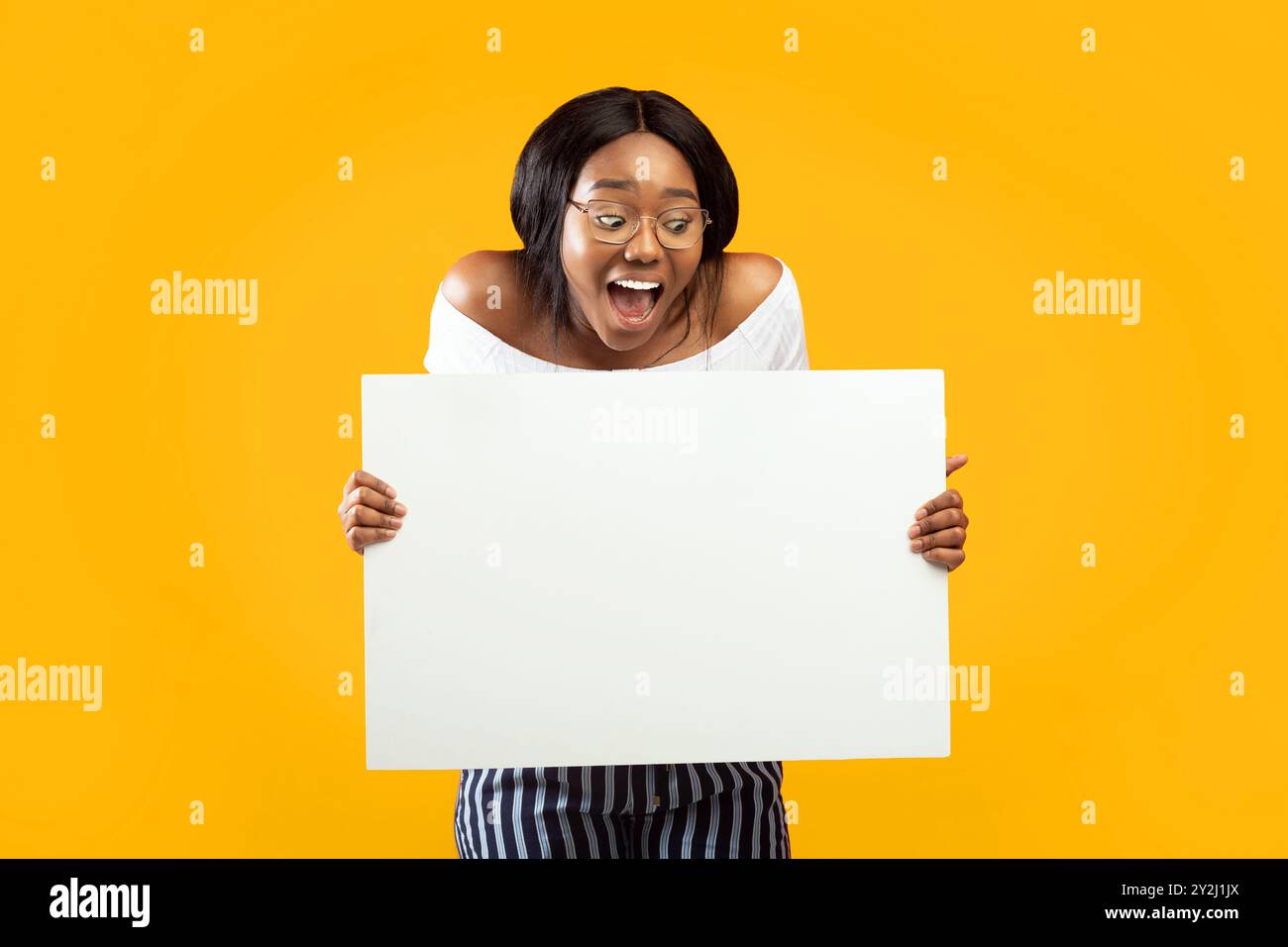 Excited Girl Shouting Holding White Board Standing, Studio Shot, Mockup ...