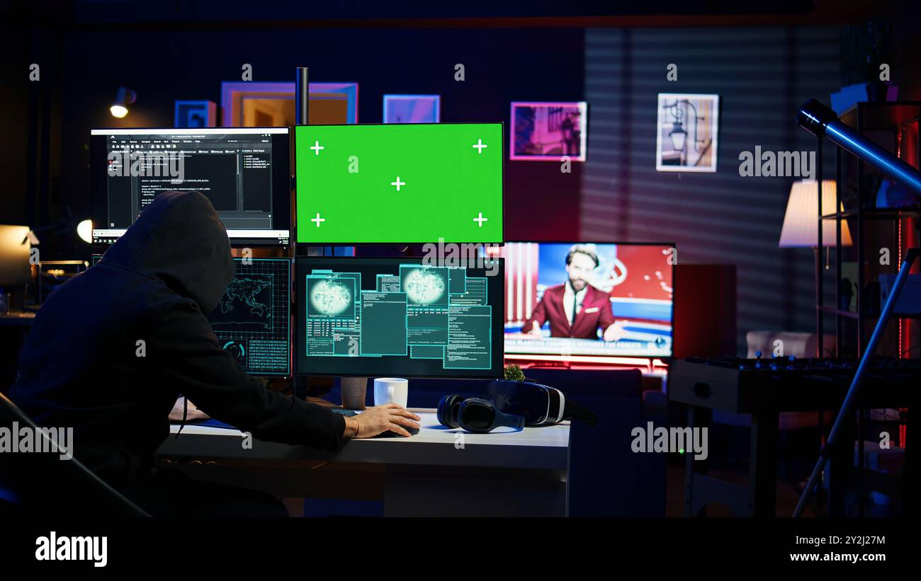 Spy using green screen PC in secret hideout to steal valuable data by ...