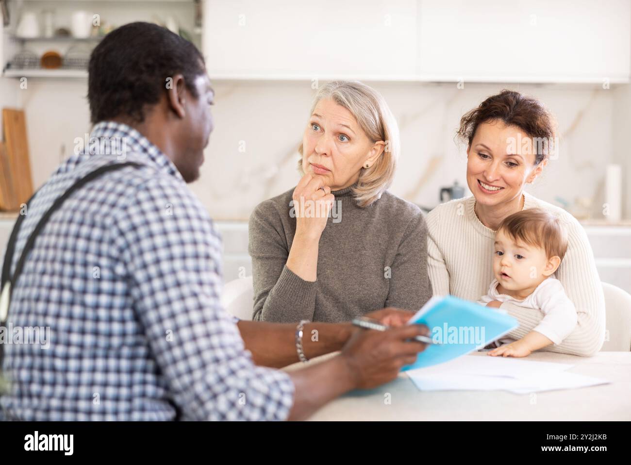 Different generations talking hi-res stock photography and images - Alamy