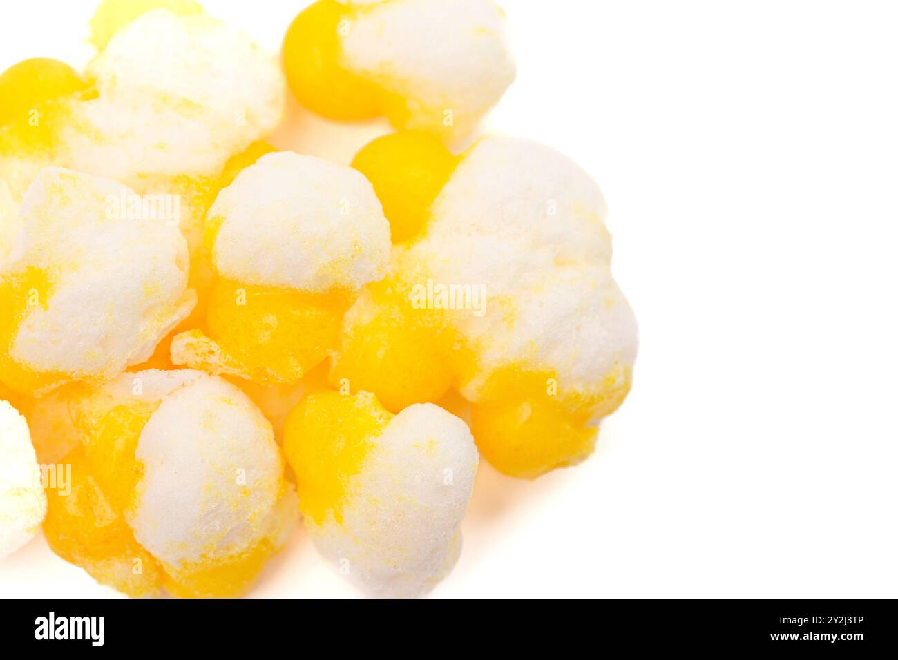 Yellow Freeze Dried Lemon Flavored Candy Isolated on a White Background ...