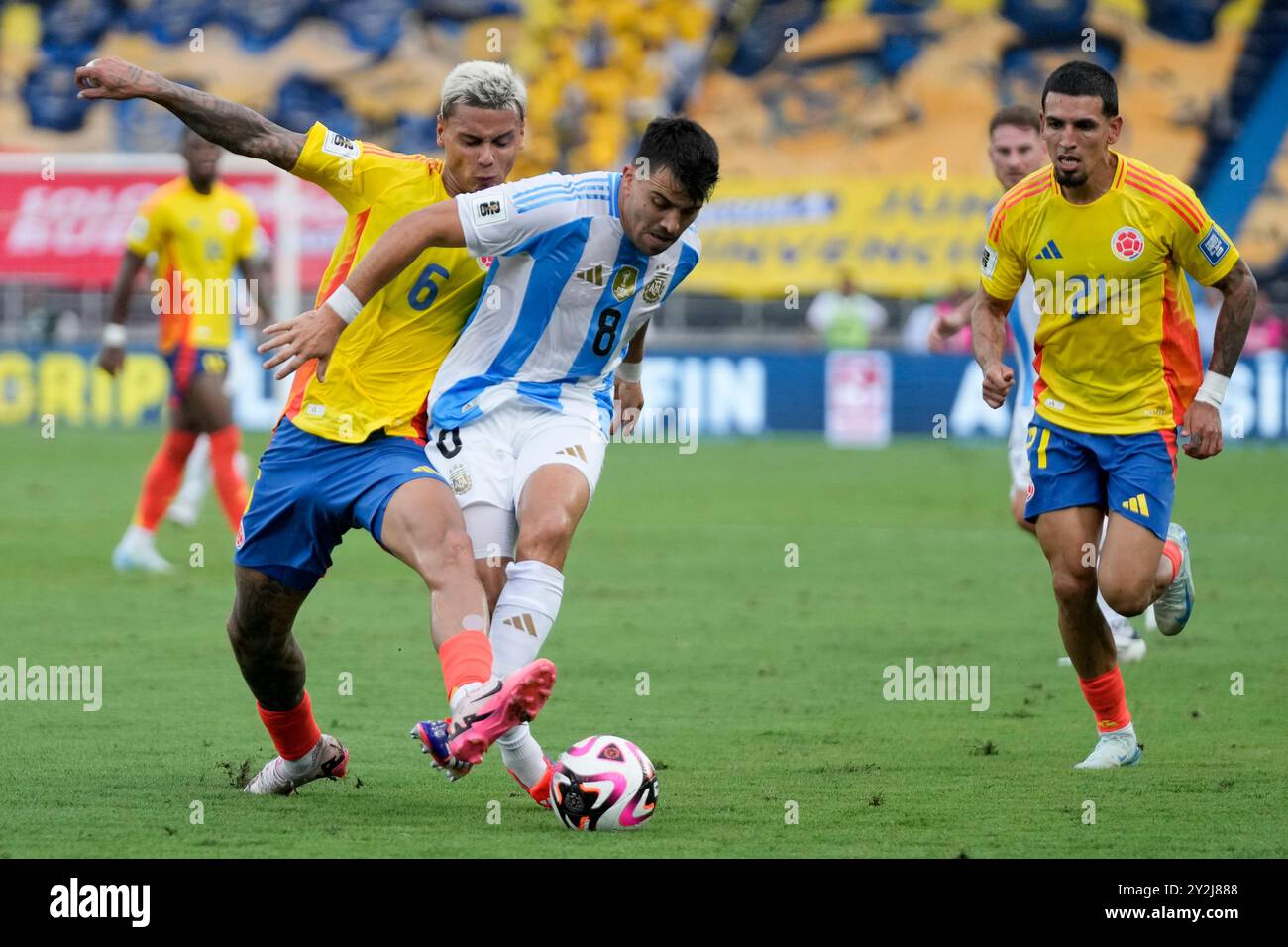 Colombia's Richard Rios, left, and Argentina's Marcos Acuna battle for ...