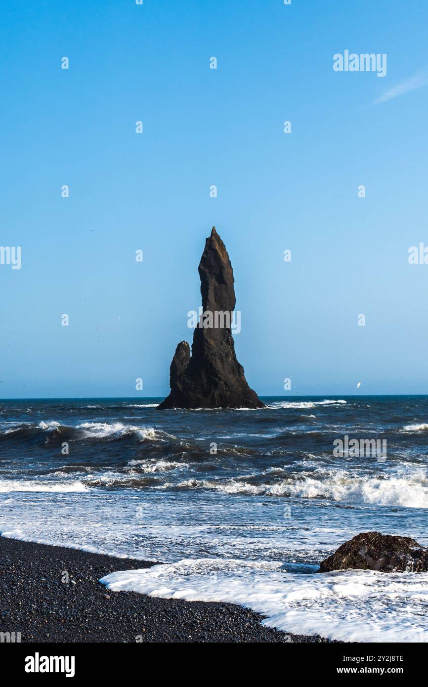 The dramatic Reynisfjara Beach features black volcanic sands and ...