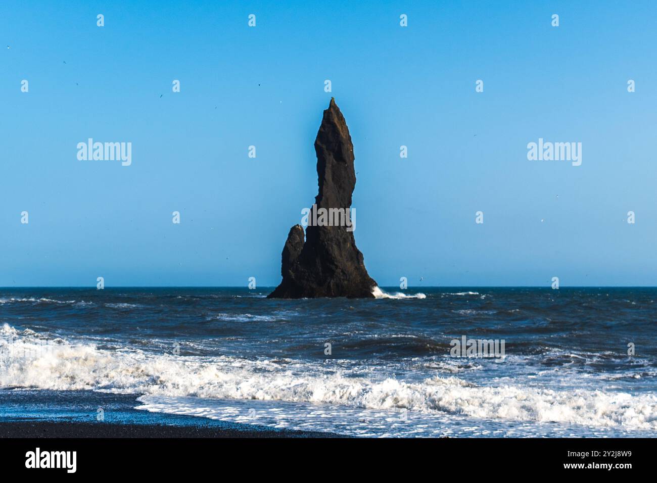 The dramatic Reynisfjara Beach features black volcanic sands and ...