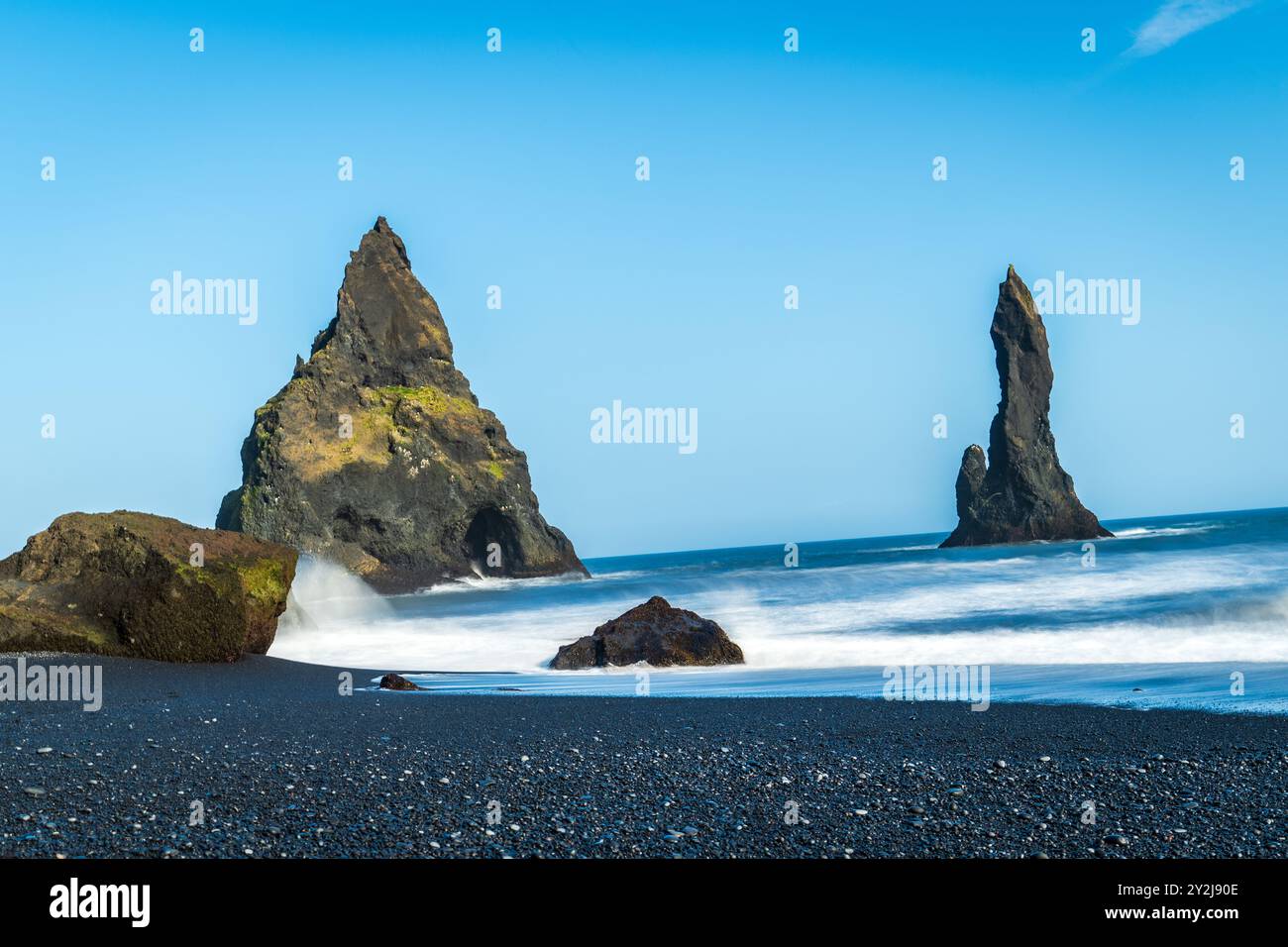 The dramatic Reynisfjara Beach features black volcanic sands and ...