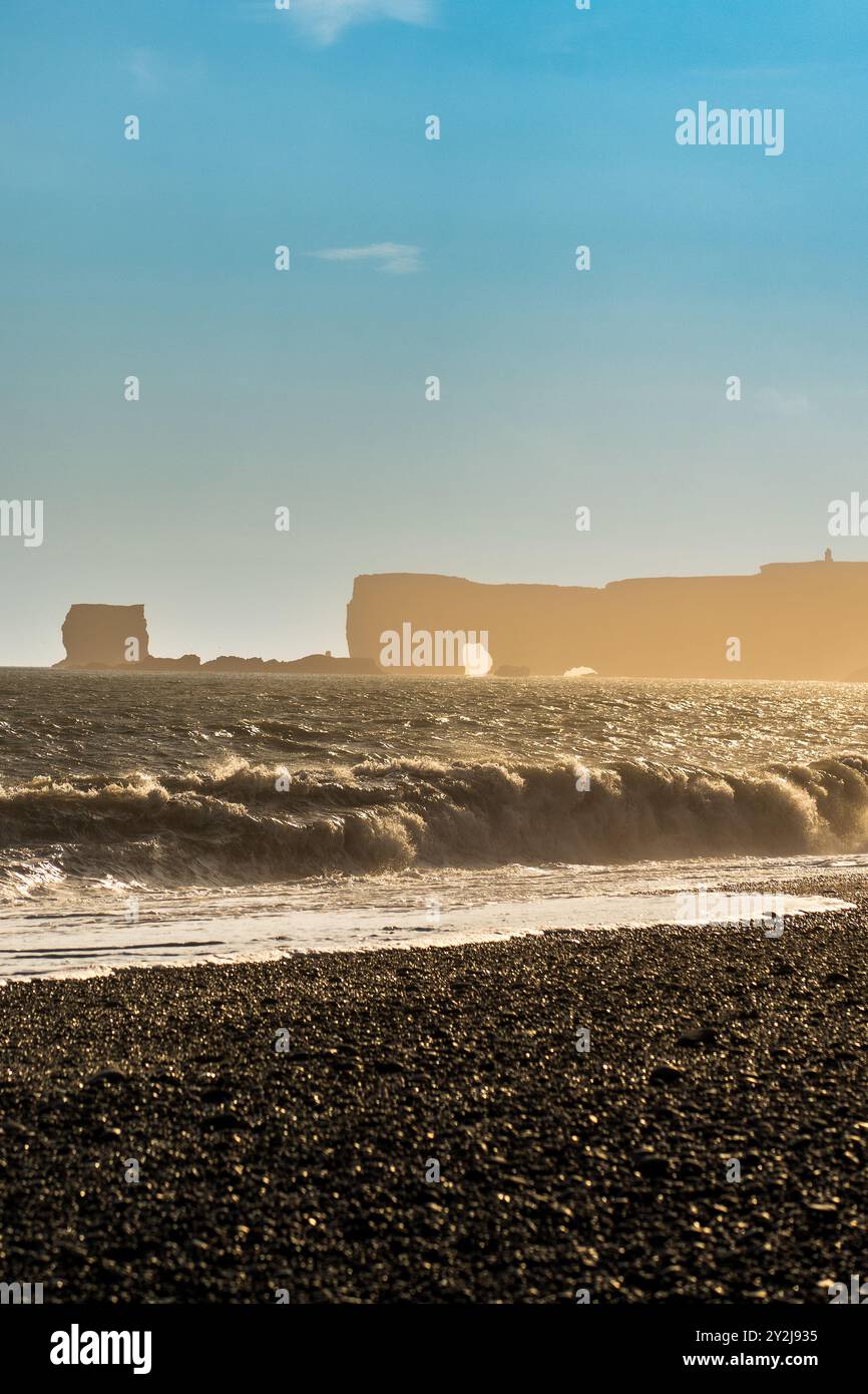 The dramatic Reynisfjara Beach features black volcanic sands and ...