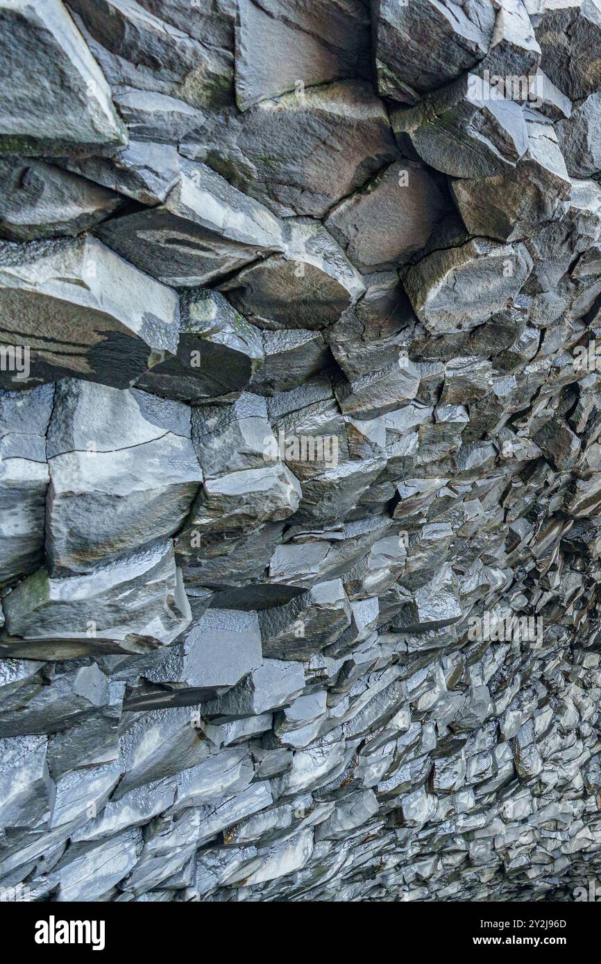 The dramatic Reynisfjara Beach features black volcanic sands and ...