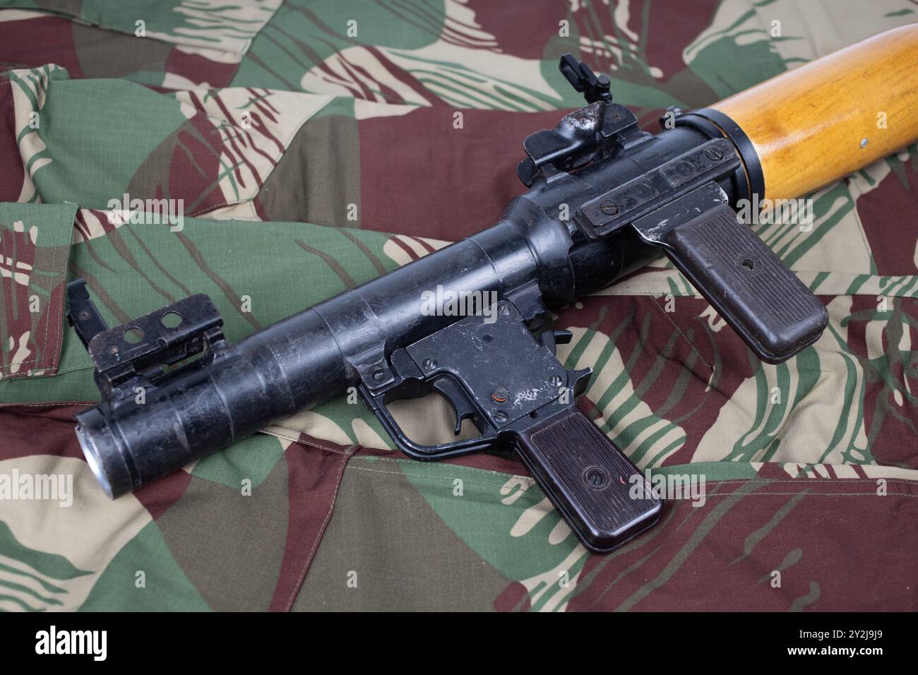 rocket propelled grenade launcher RPG 7 on camo uniform background ...