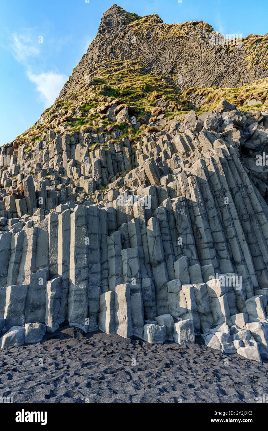 The dramatic Reynisfjara Beach features black volcanic sands and ...