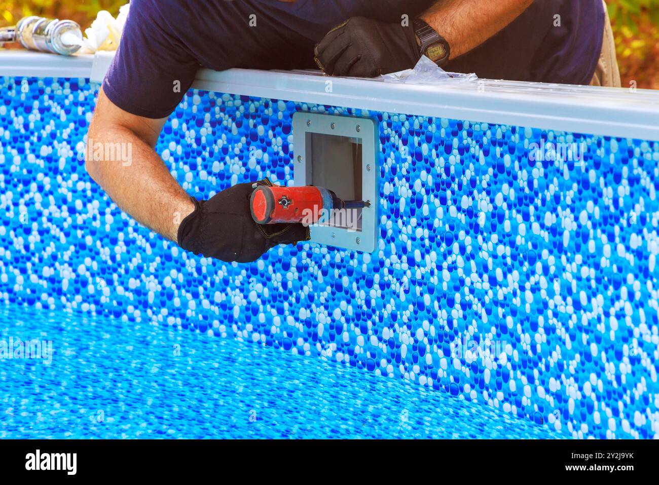 Cleaning of water surface pool with skimmer basket that is mounted to ...