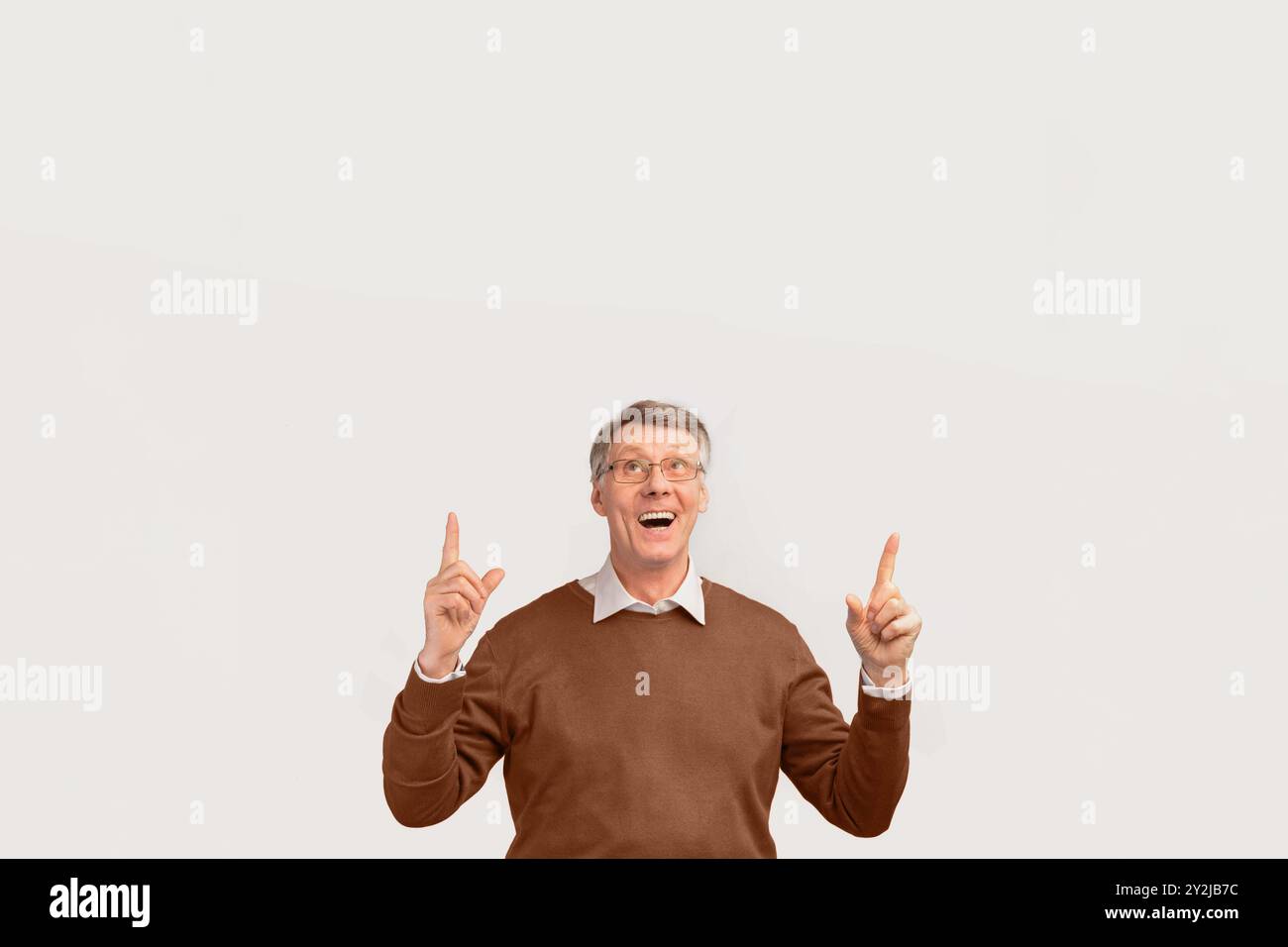 Excited Senior Man Pointing Fingers Up Standing Over White Background ...