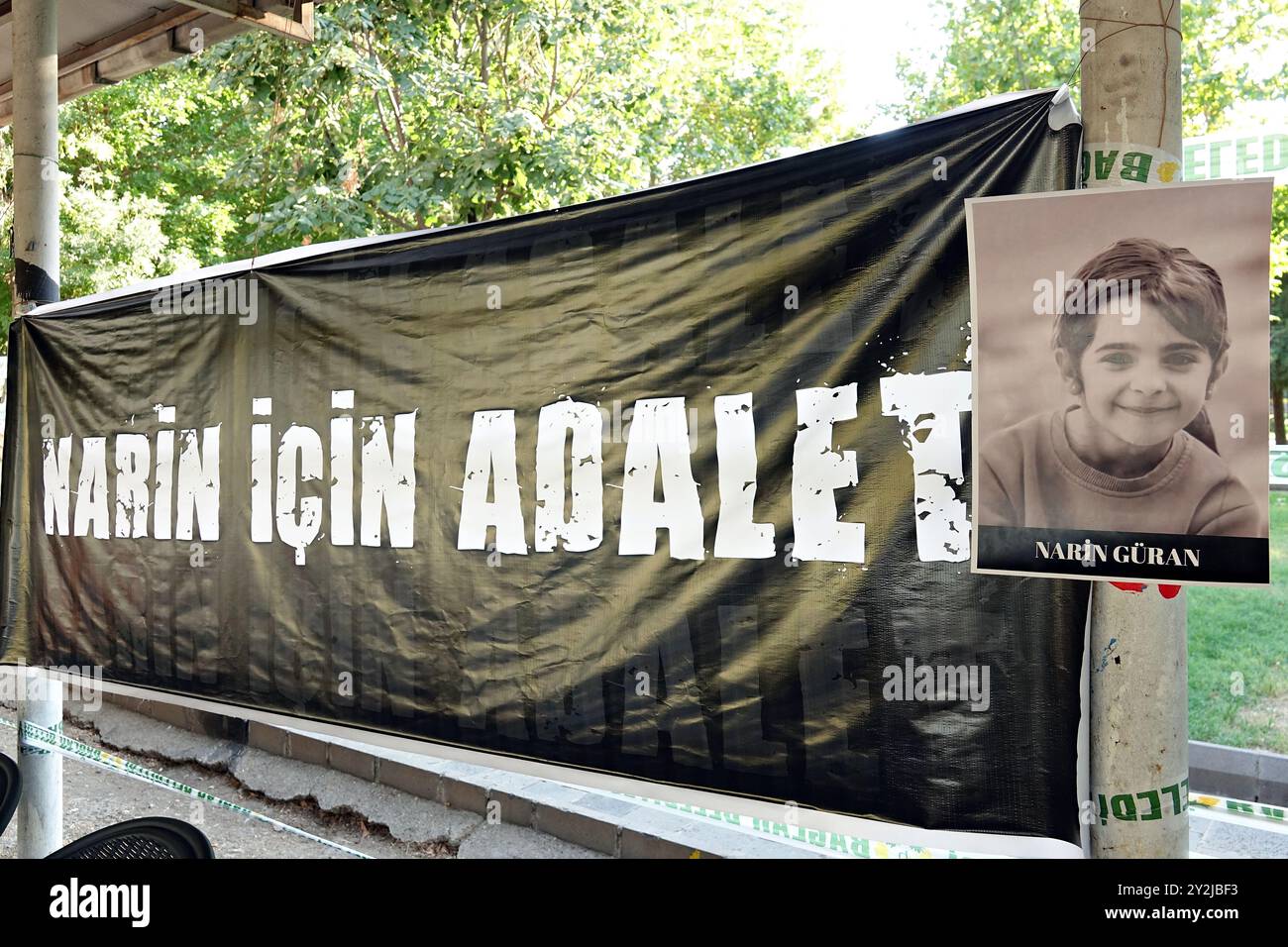A poster of Narin and a banner reading ‘Justice for Narin' are seen ...
