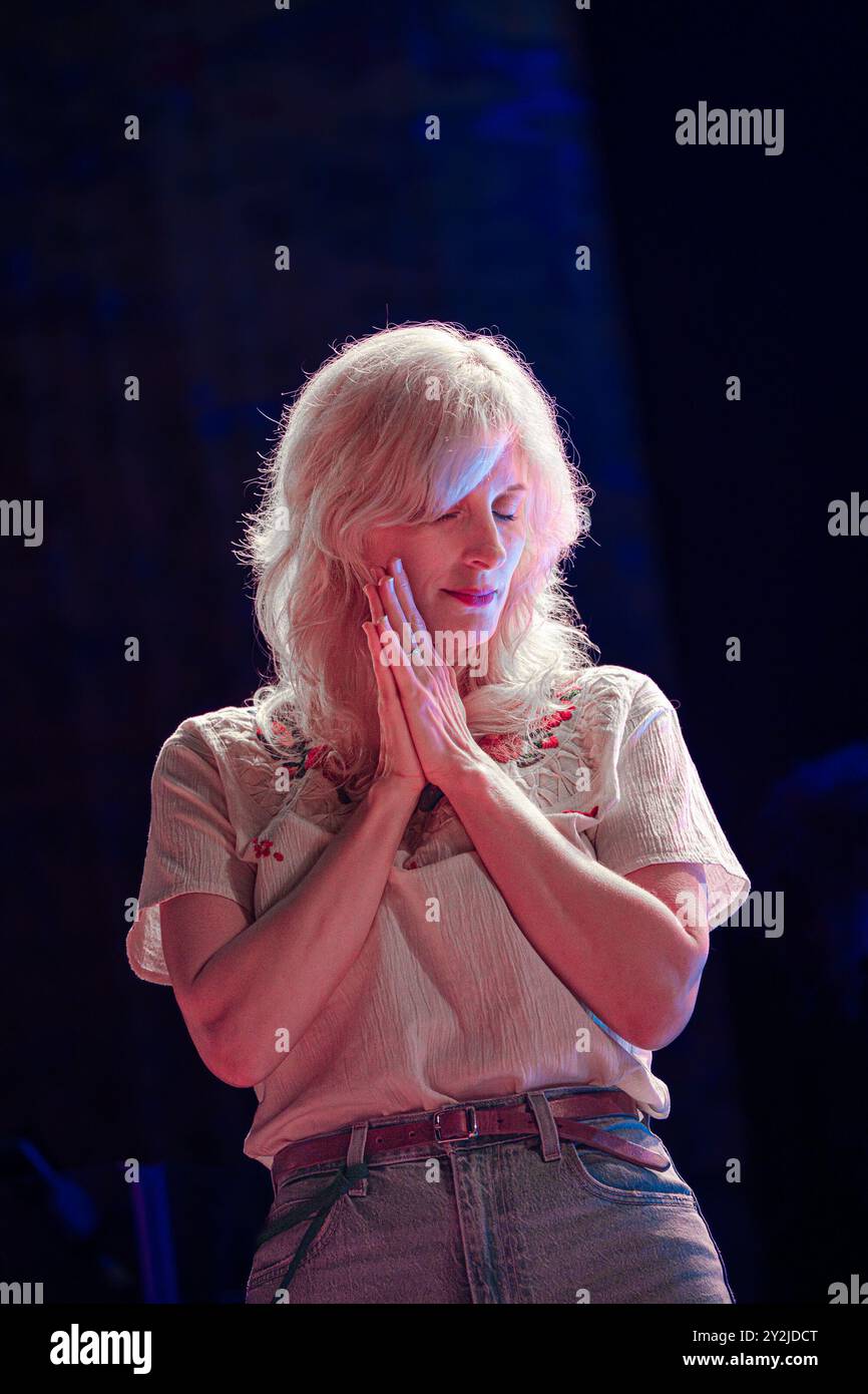 Contemplative Melissa McClelland, hands together, singer Whitehorse ...