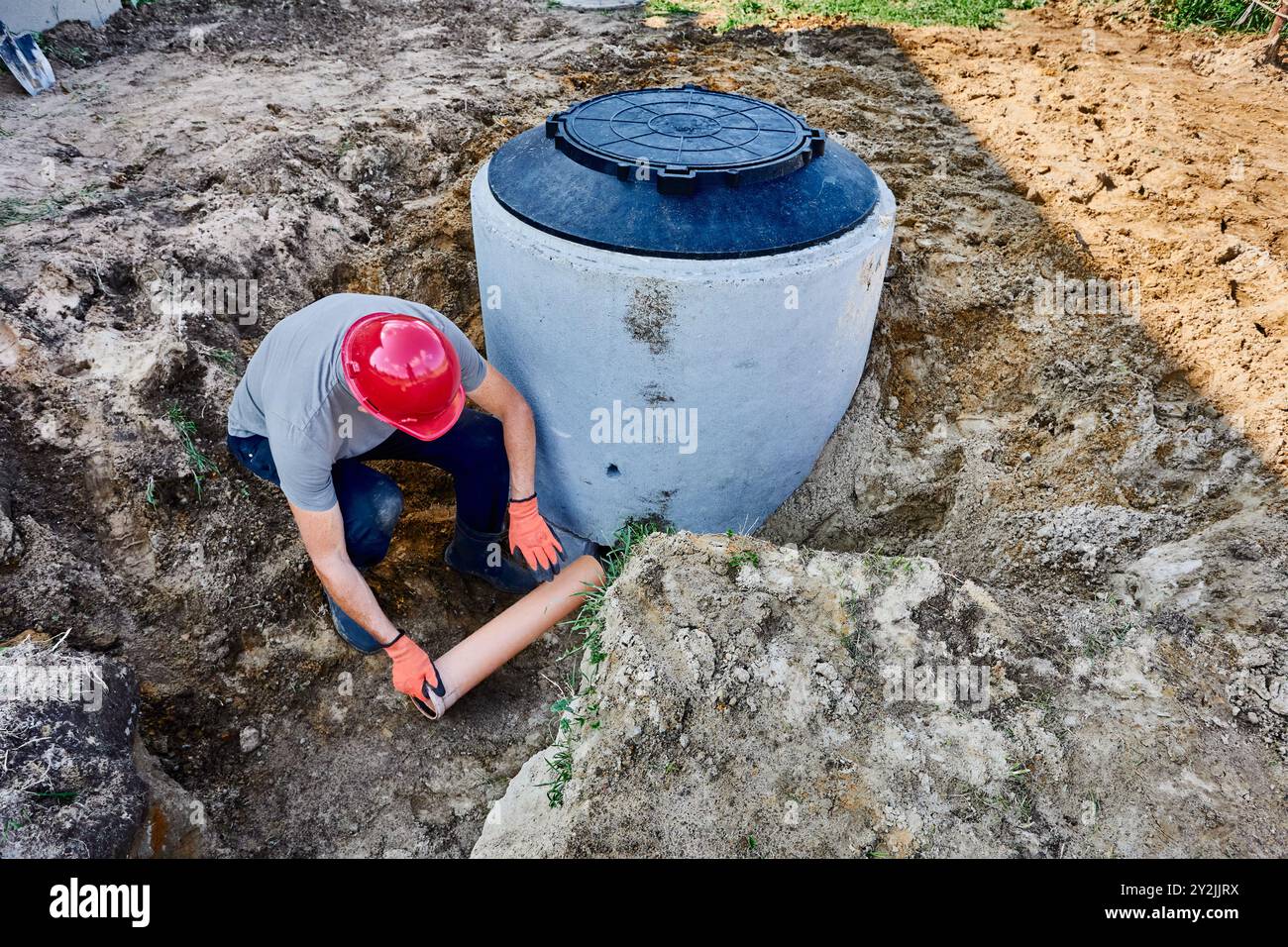 Connecting septic tank to external disposal system, installing out ...