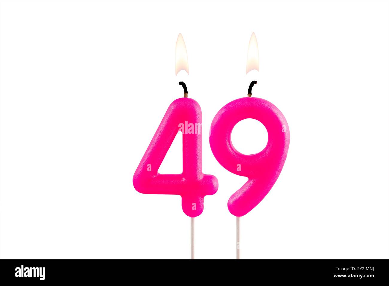 Pink number 49 birthday candle on white background Stock Photo - Alamy