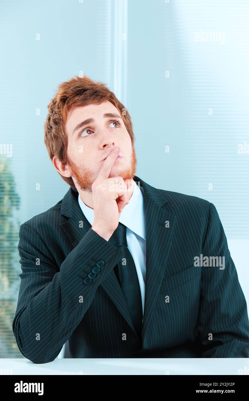 Brainstorming contemplating hi-res stock photography and images - Alamy