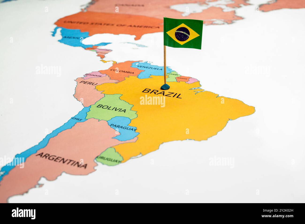 A map of Brazil with a Brazilian flag on it. The flag is green. Travel ...