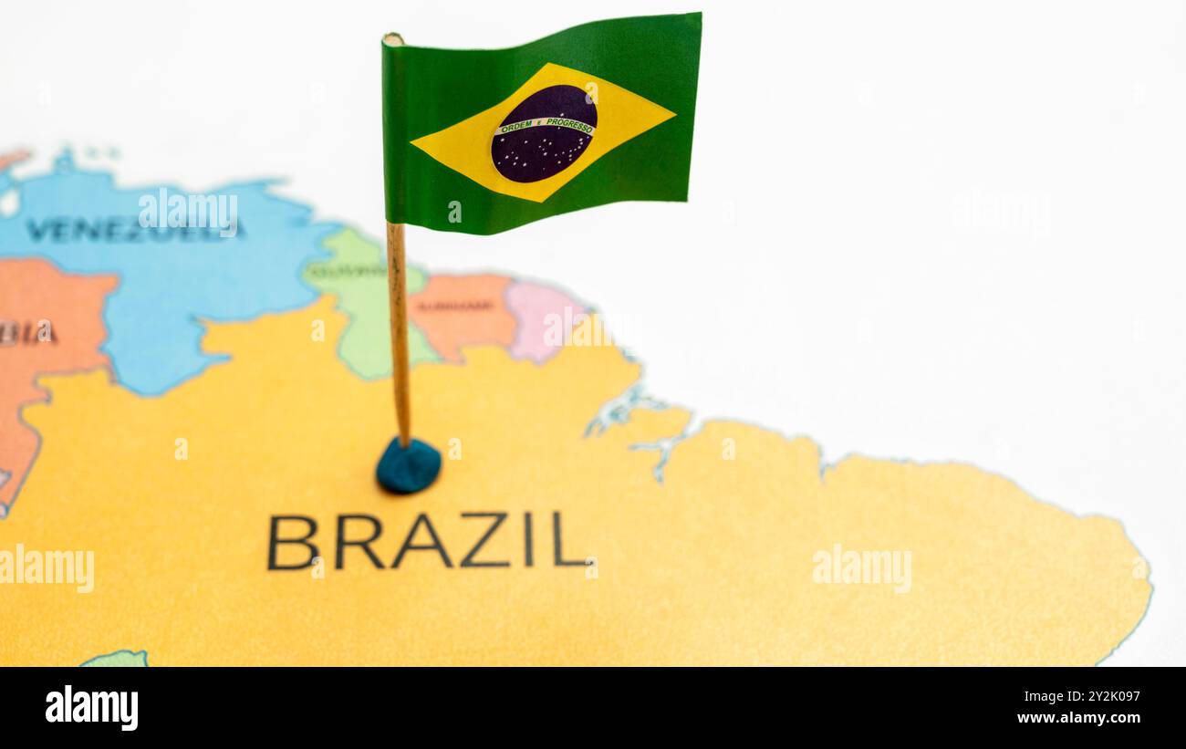 A map of Brazil with a Brazilian flag on it. The flag is green. Travel ...