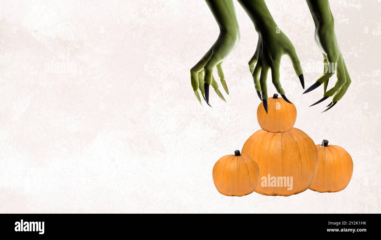 Witches hand reach a stack of pumpkins. The scene has a creepy and ...