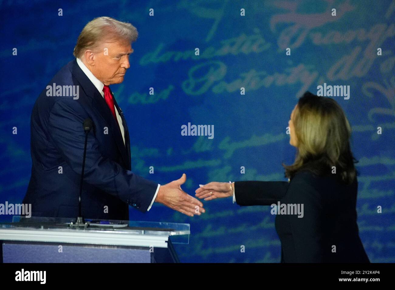 Republican presidential nominee former President Donald Trump shakes ...