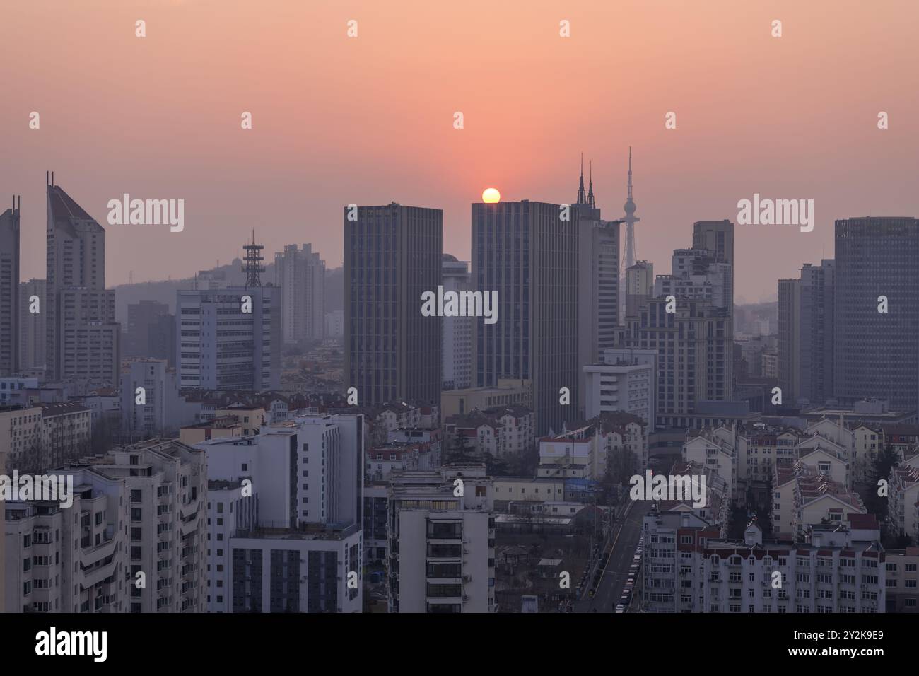 The view from above on the downtown of Qingdao, Shandong, sunset sky ...