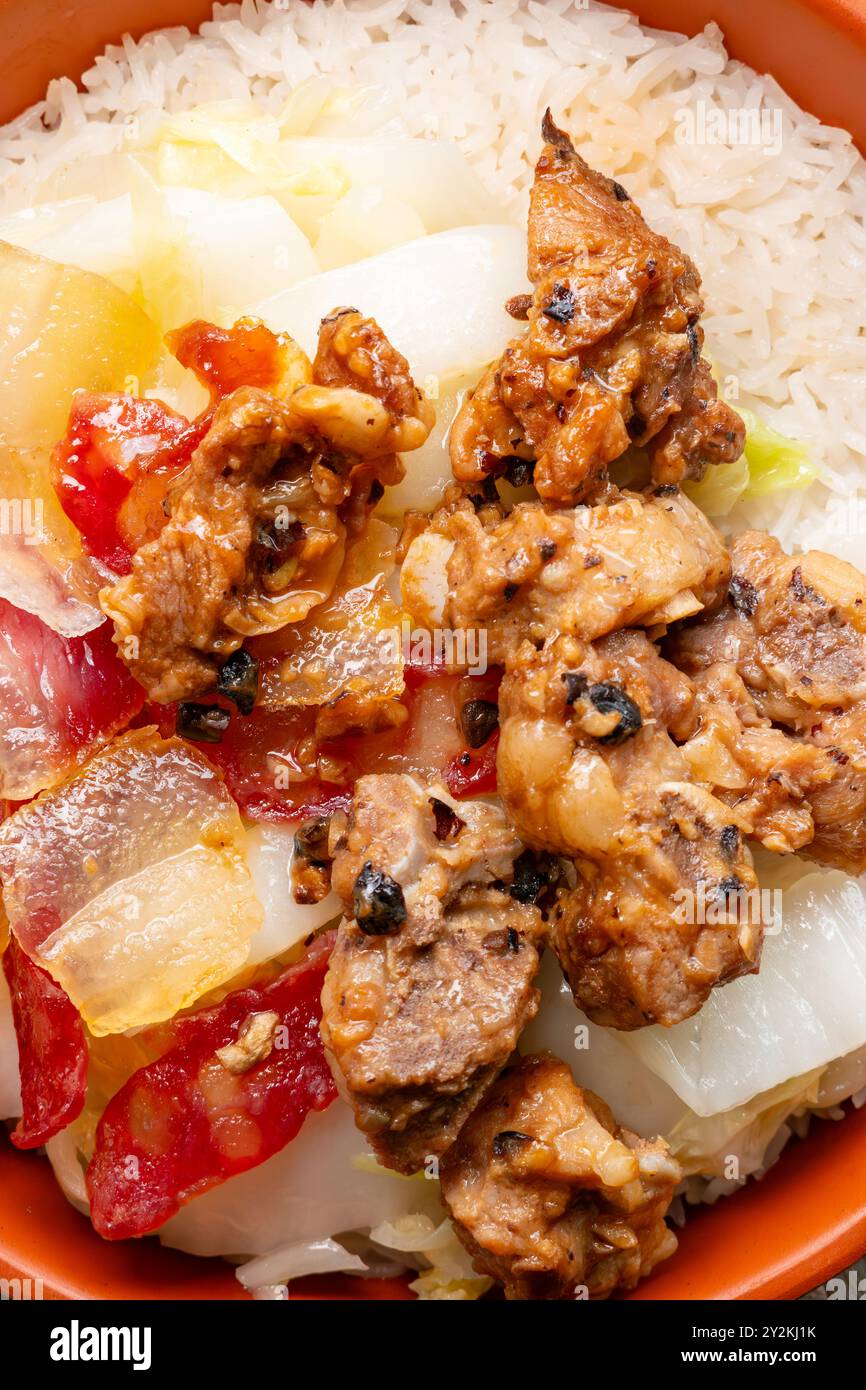 top view clay pot rice of pork ribs and preserved meats and Chinese ...