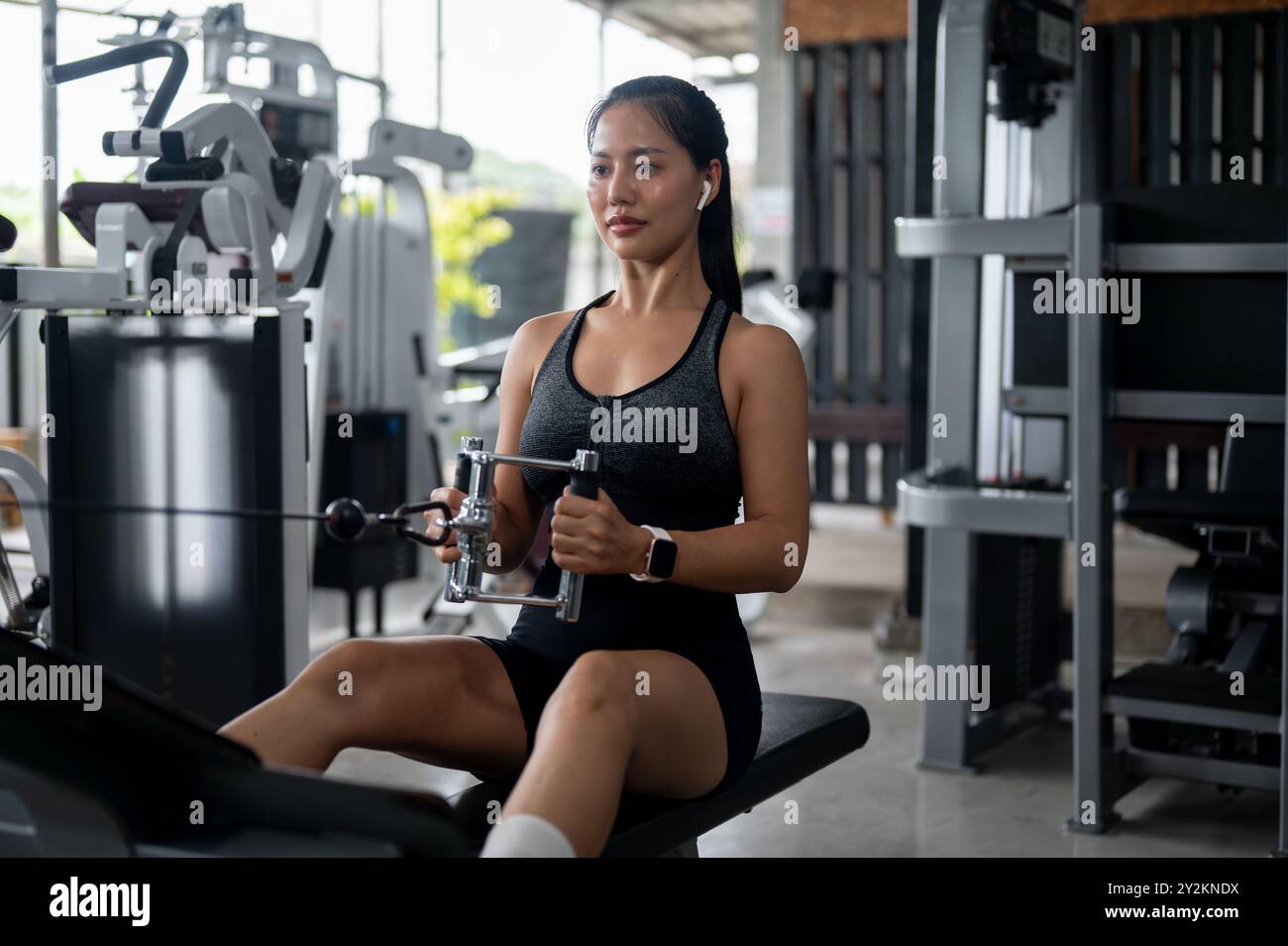 Female athlete exercising cable hi-res stock photography and images - Alamy