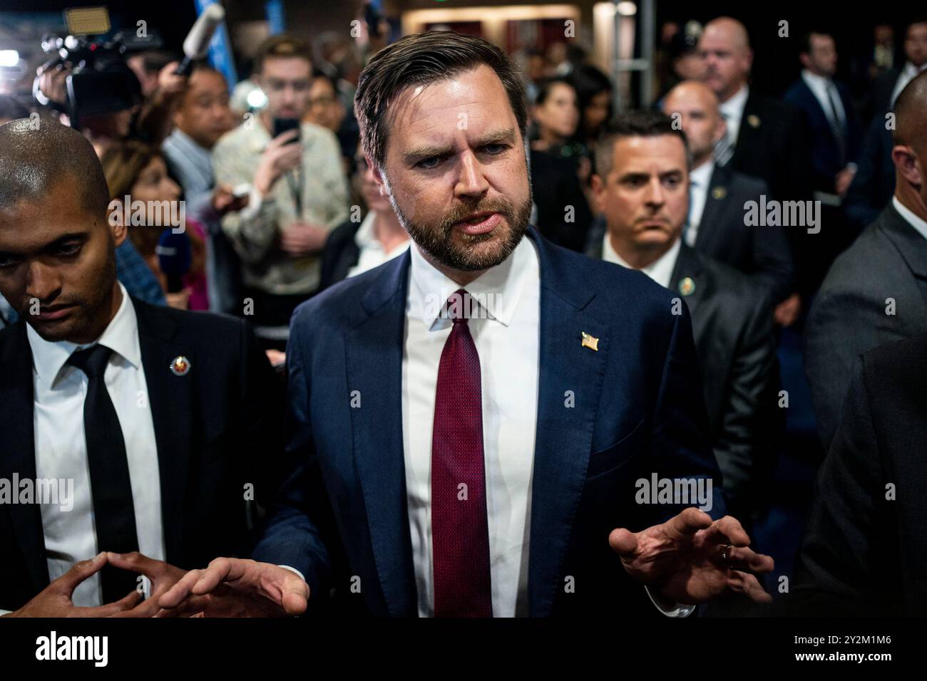 Republican vice-presidential nominee JD Vance speaks to reporters in ...
